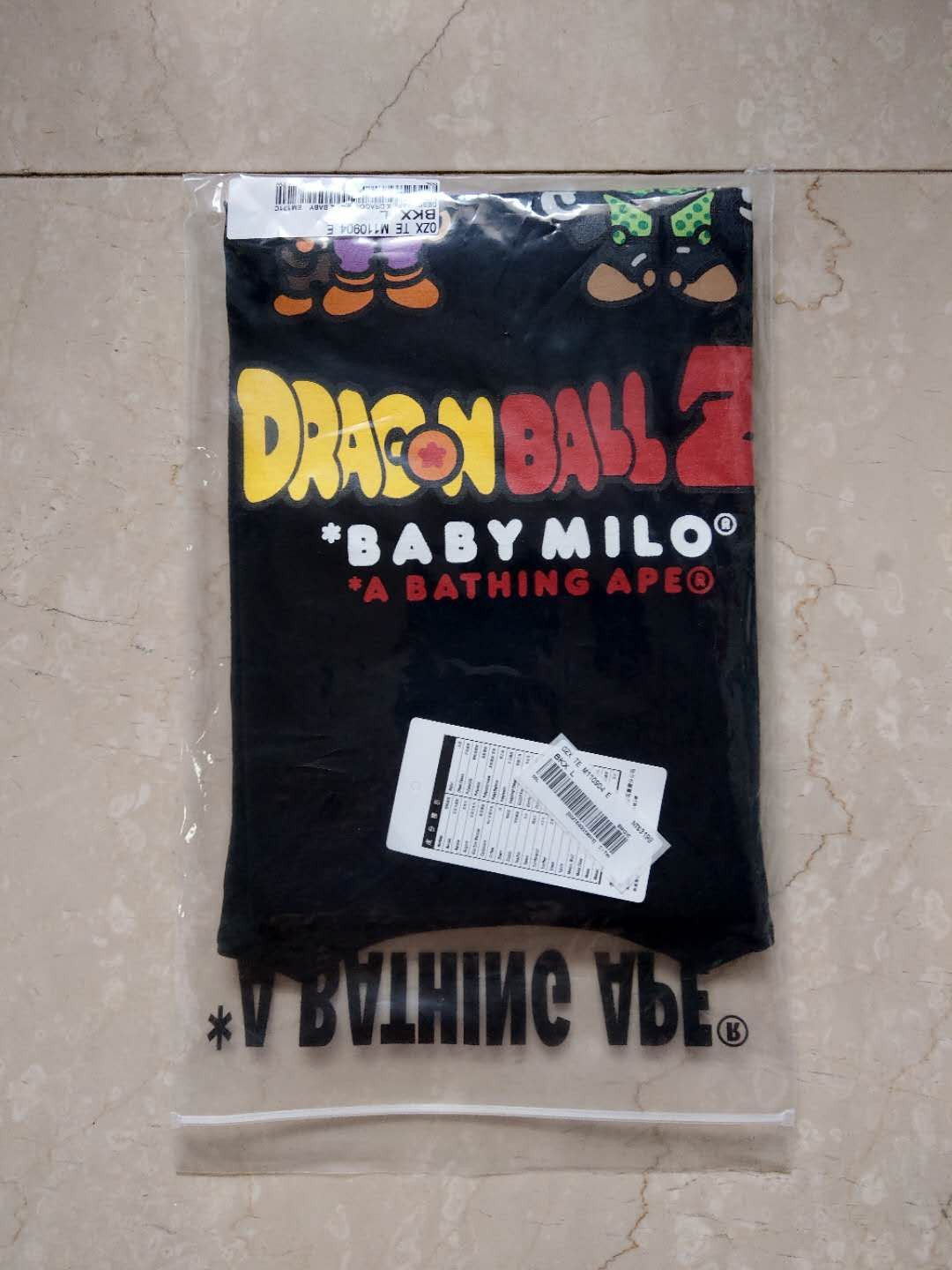 Bape BAPE x Dragon Ball Z Baby Milo Son Gohan & Cell Tee Black | Grailed