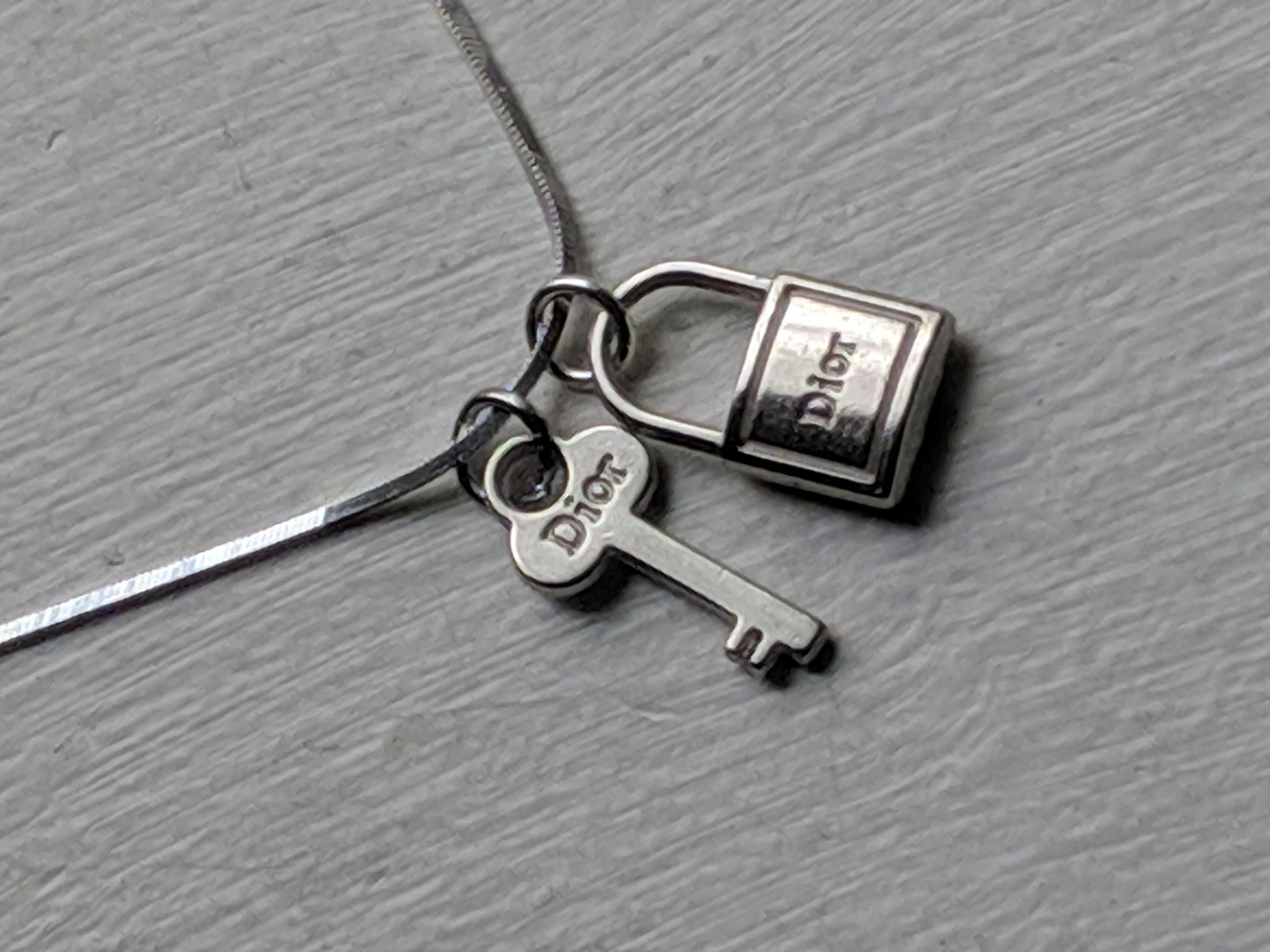 Christian Dior Monsieur × Dior Christian Dior Silvertone Padlock Lock ...