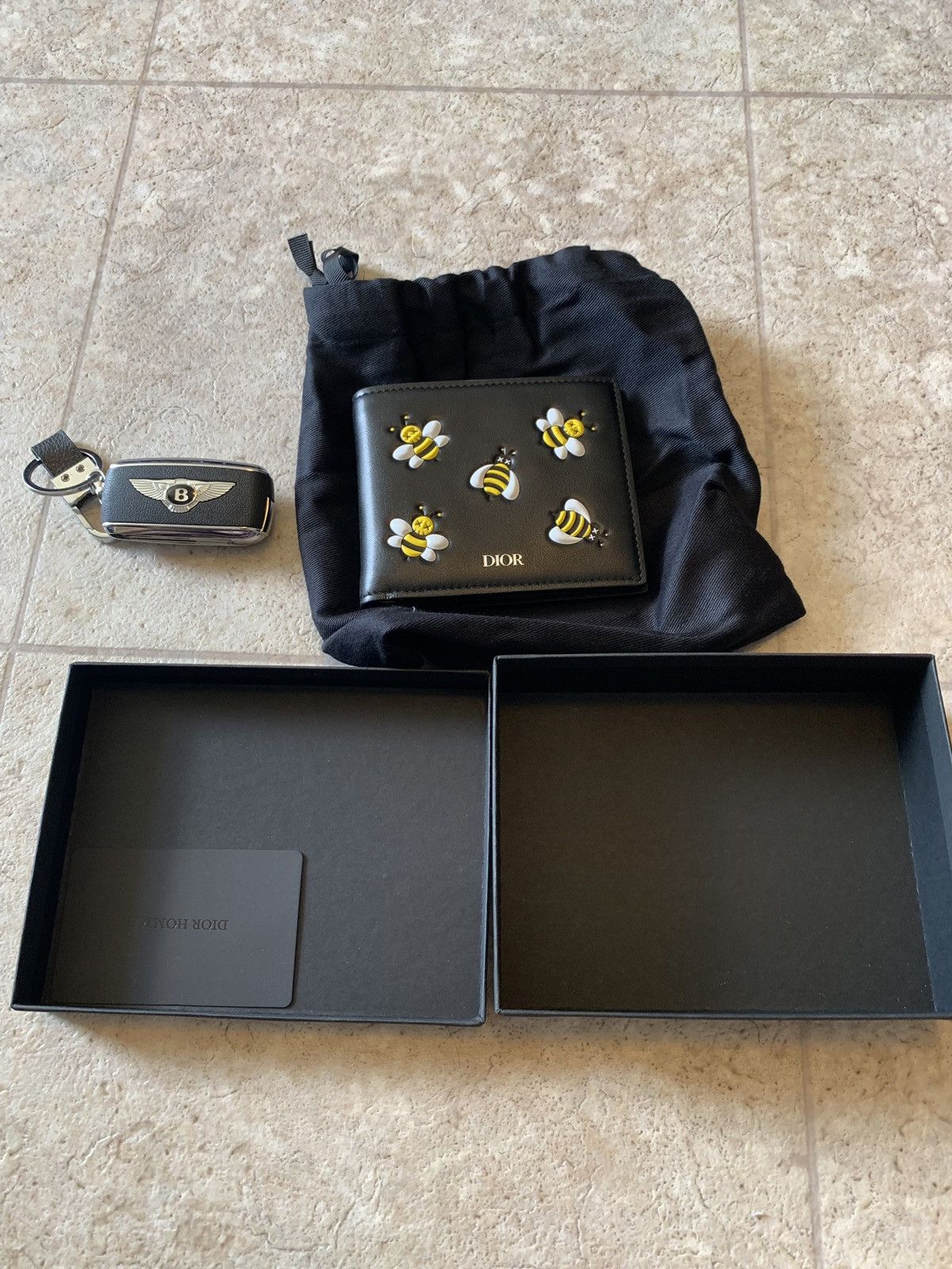 Dior × Kaws Dior x Kaws Yellow bee bifold wallet | Grailed
