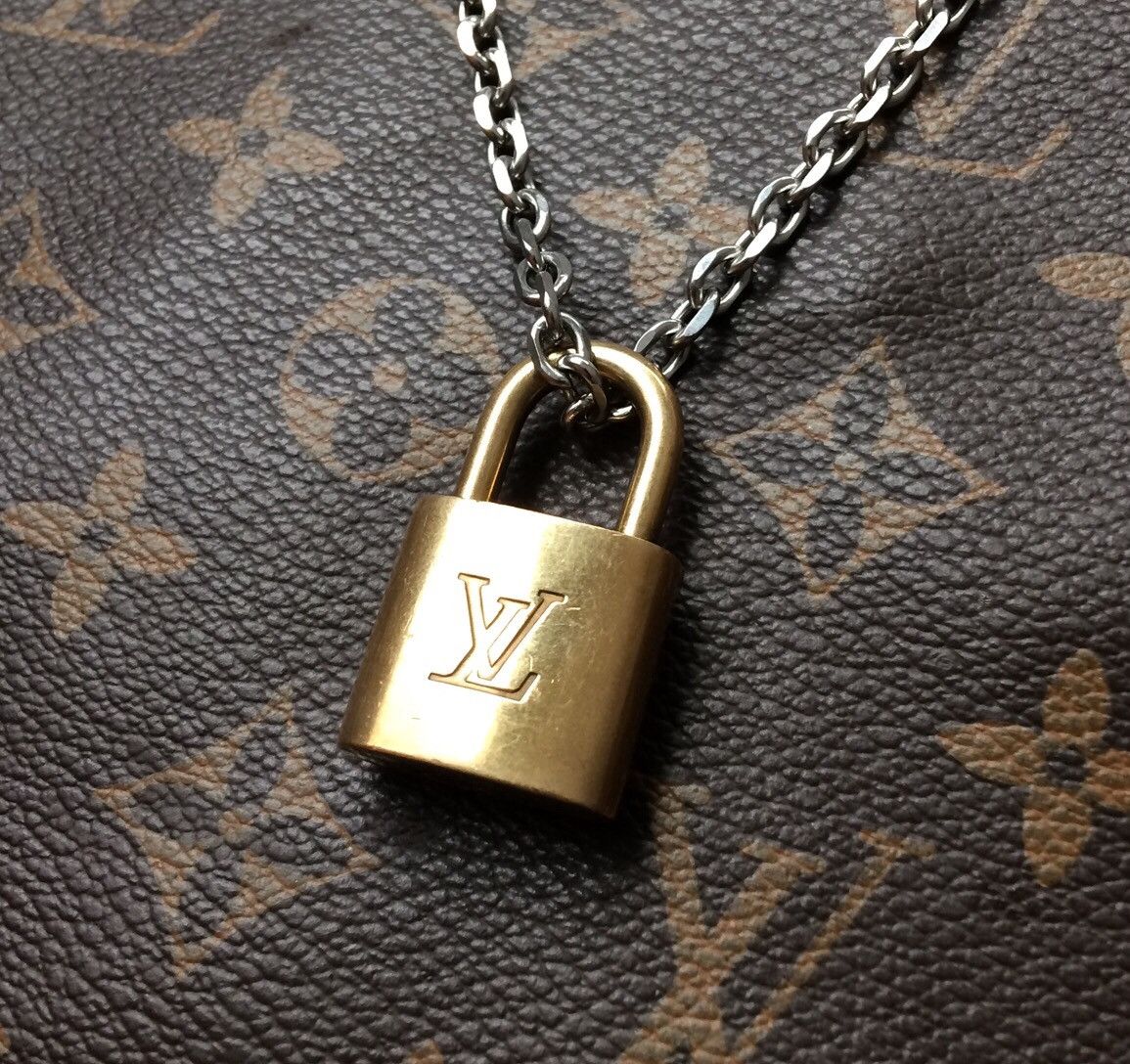 Louis Vuitton AUTHENTIC VINTAGE LOUIS VUITTON LOCK + CHAIN | Grailed