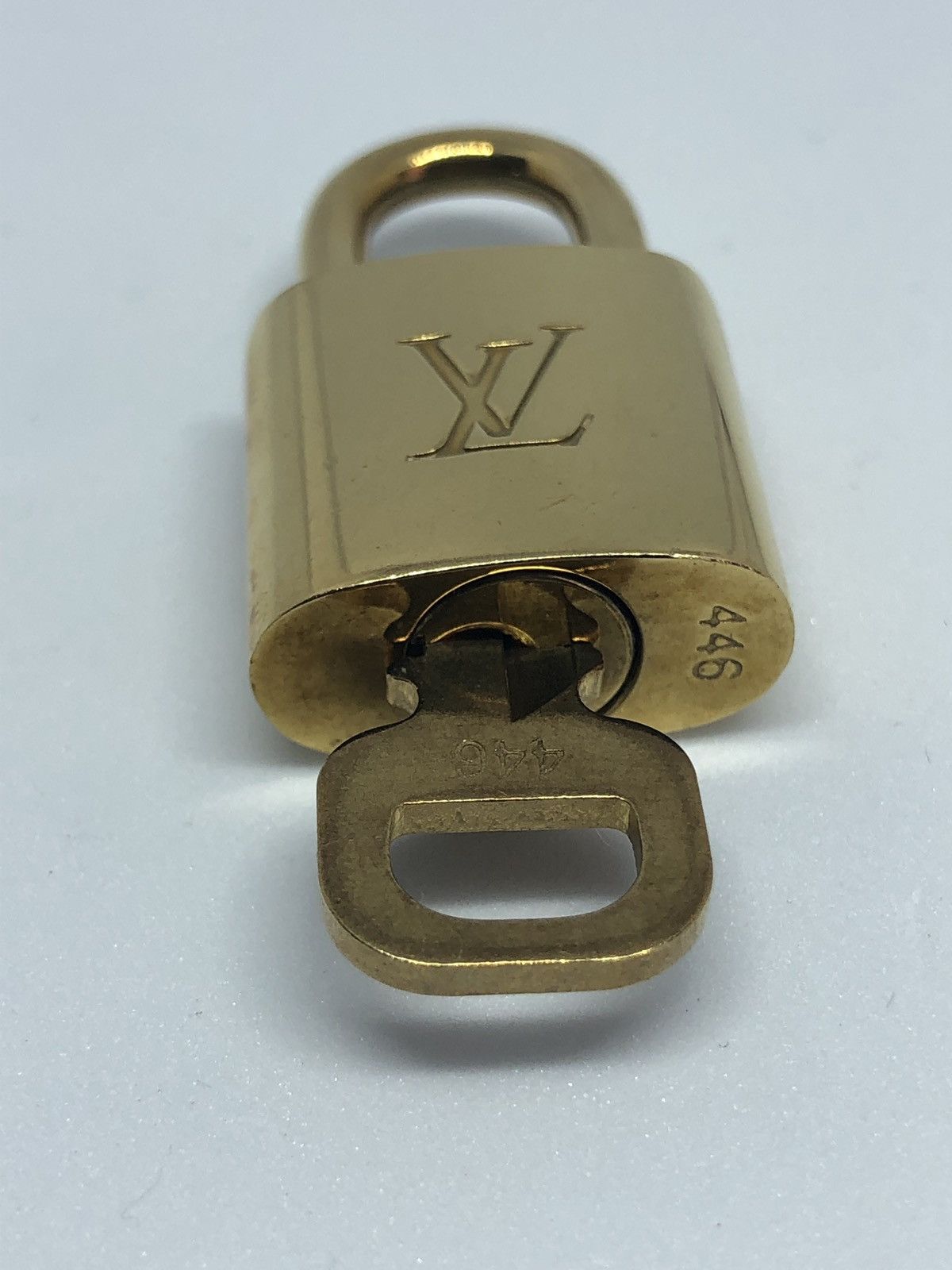 Louis Vuitton Loui Vuitton Lock | Grailed