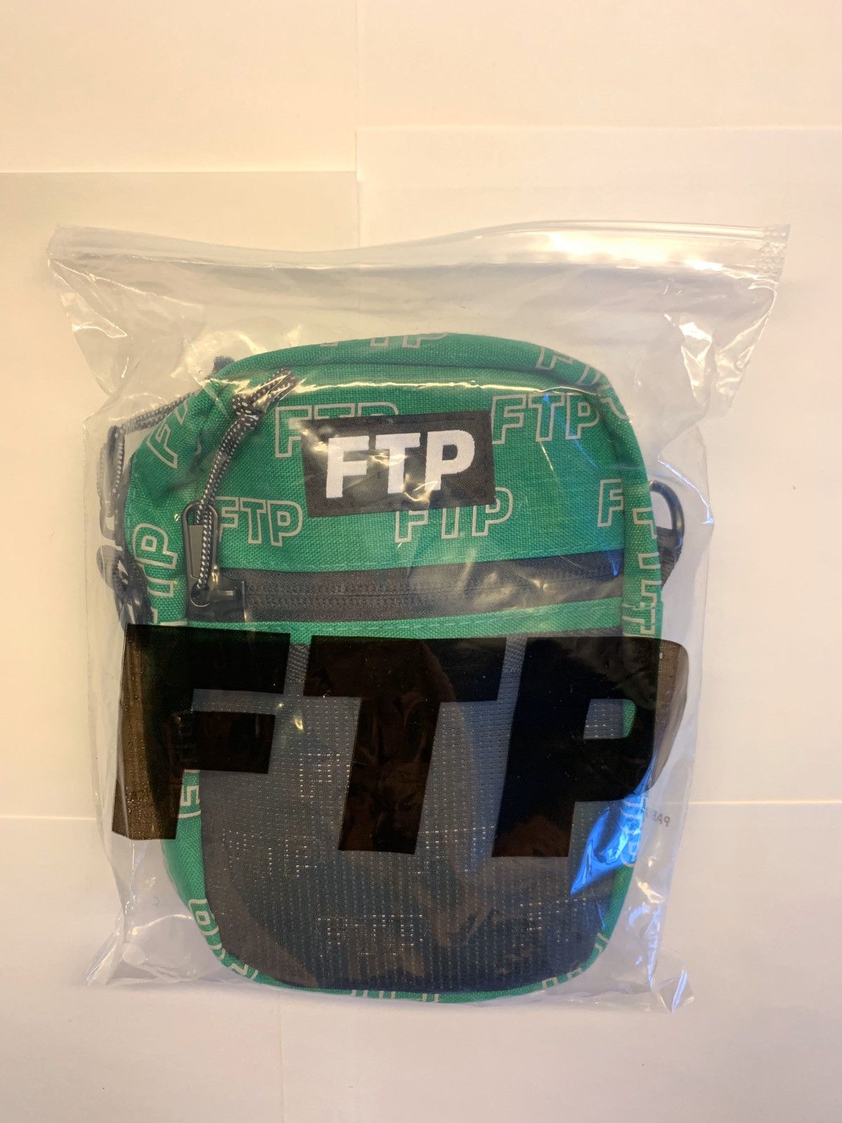 Fuck The Population FTP Outline Side Bag Green | Grailed