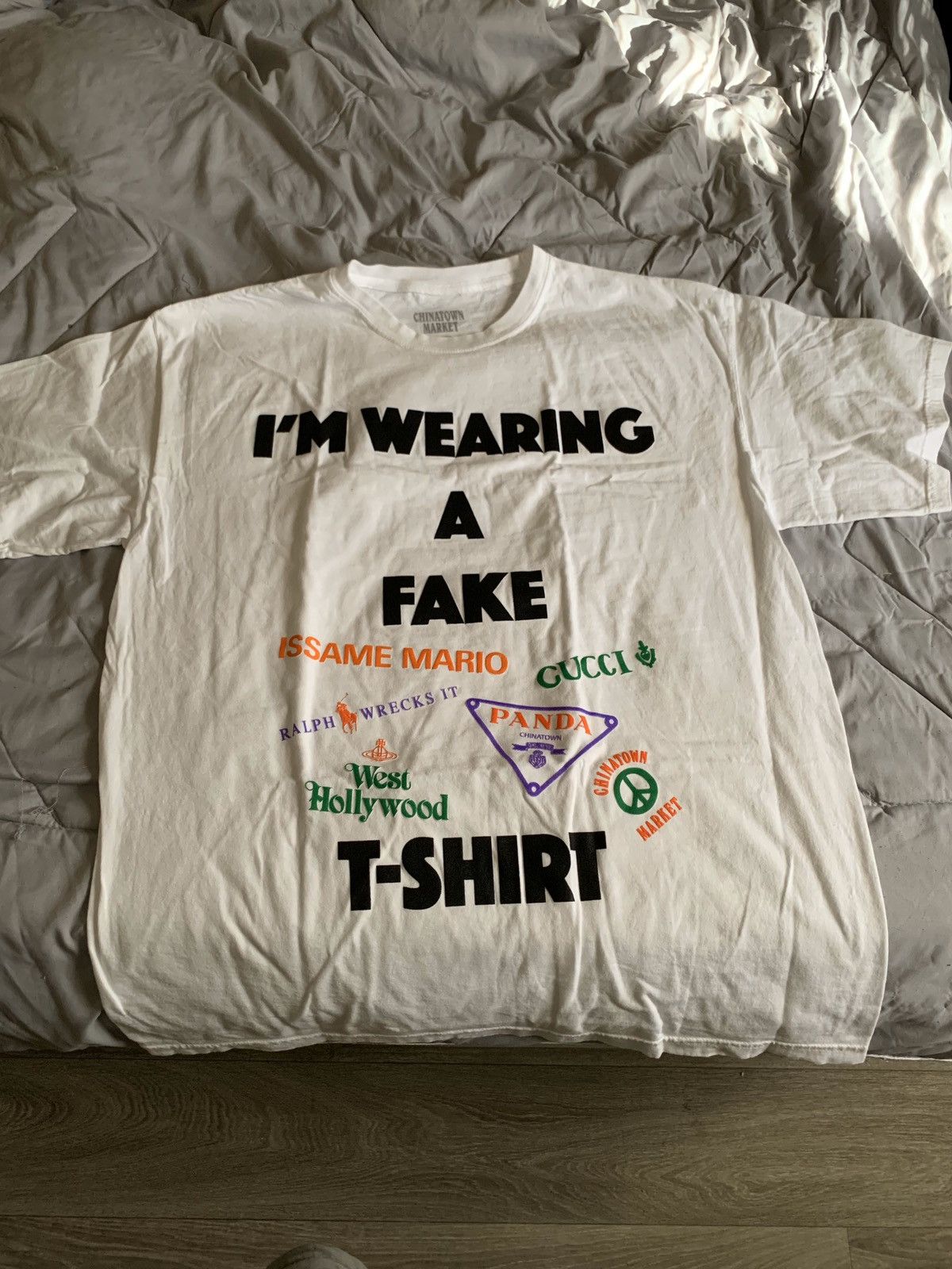 Market Unreleased “I’m wearing a fake tshirt” design | Grailed
