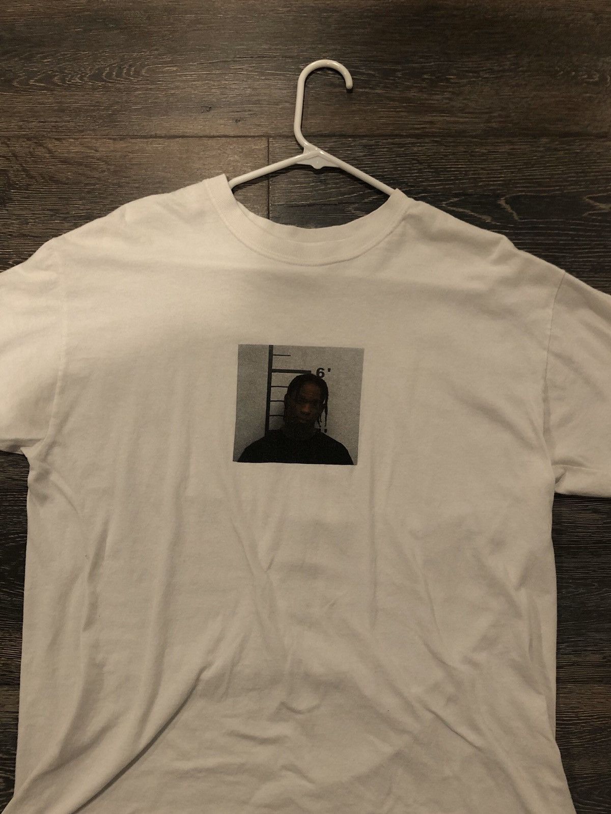 Travis Scott Travis Scott mug shot- free the rage | Grailed