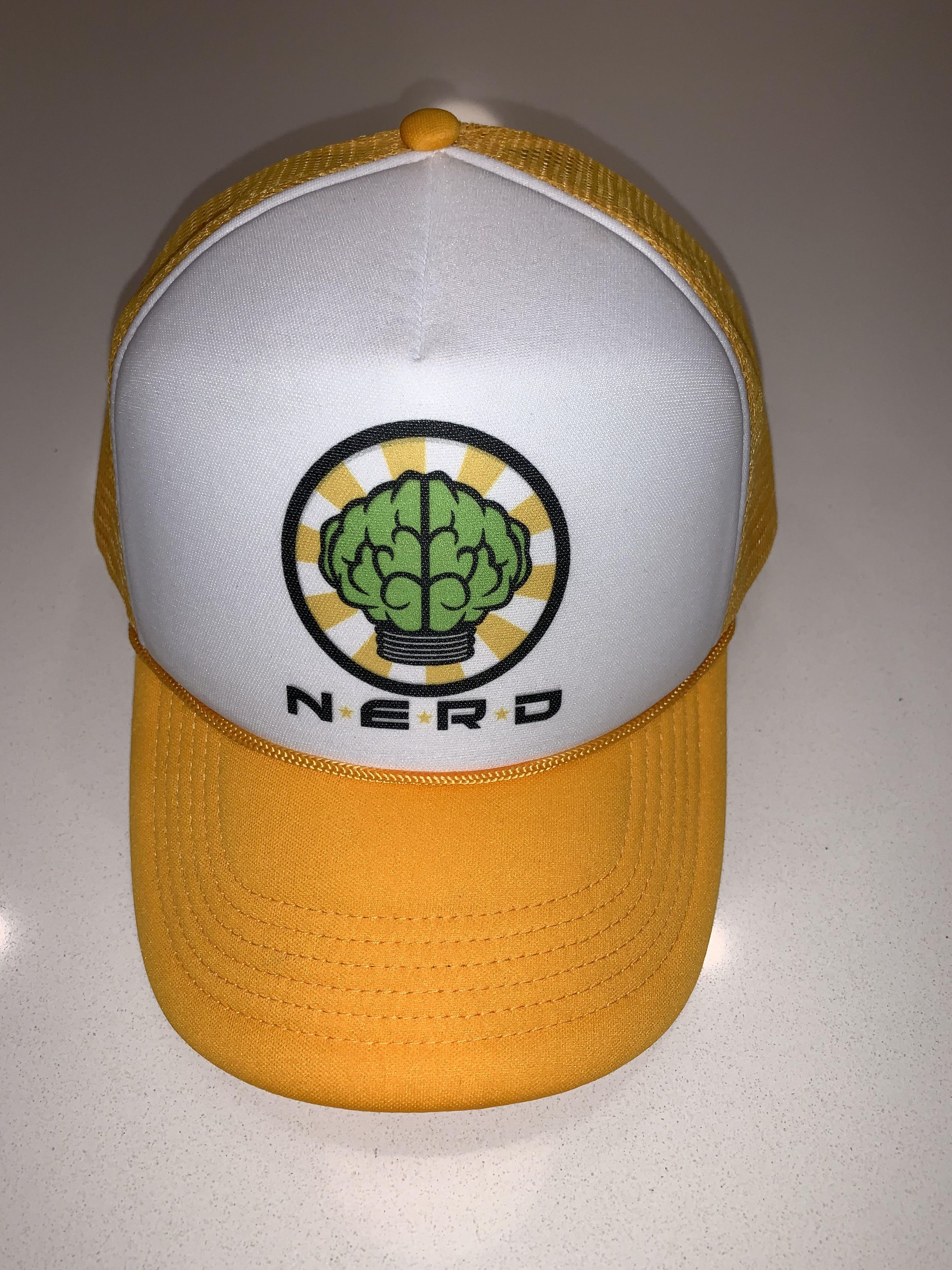Pharrell N.E.R.D Yellow Trucker hat | Grailed
