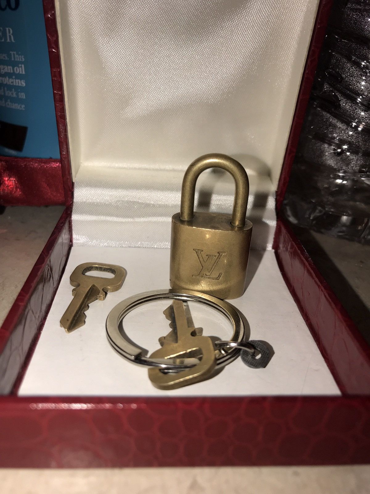 Louis Vuitton Louis Vuitton Gold Lock from bag | Grailed