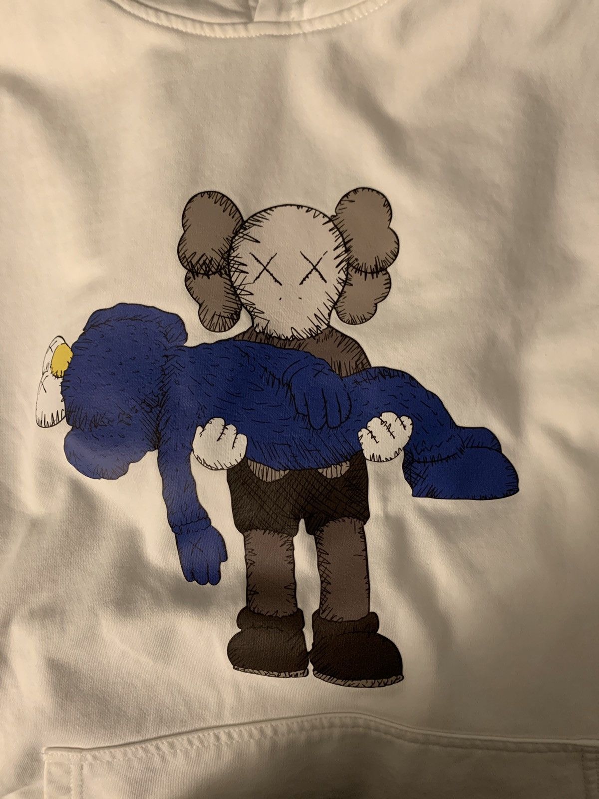 Kaws White Kaws doll holding blue Kaws doll | Grailed