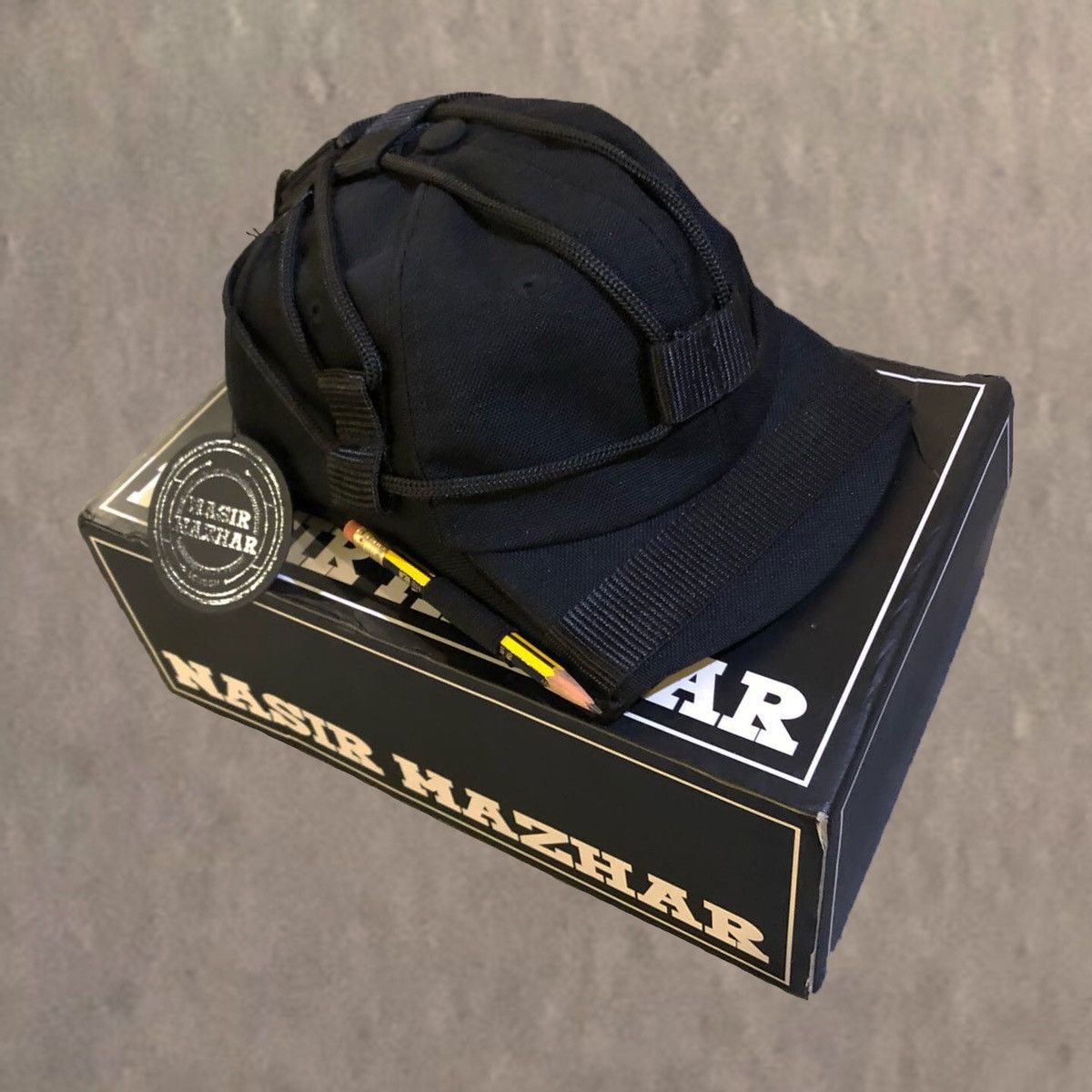 Nasir Mazhar Nasir Mazhar nylon Cap | Grailed