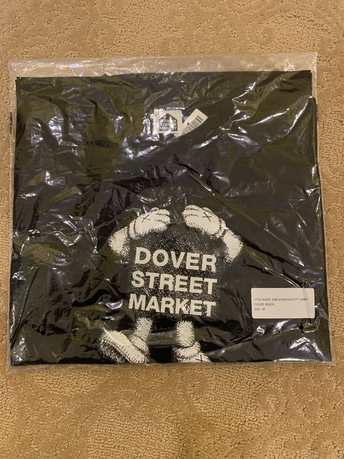 Kaws Kaws x DSM Dover Street Market Special Mascot Tee Black | Grailed