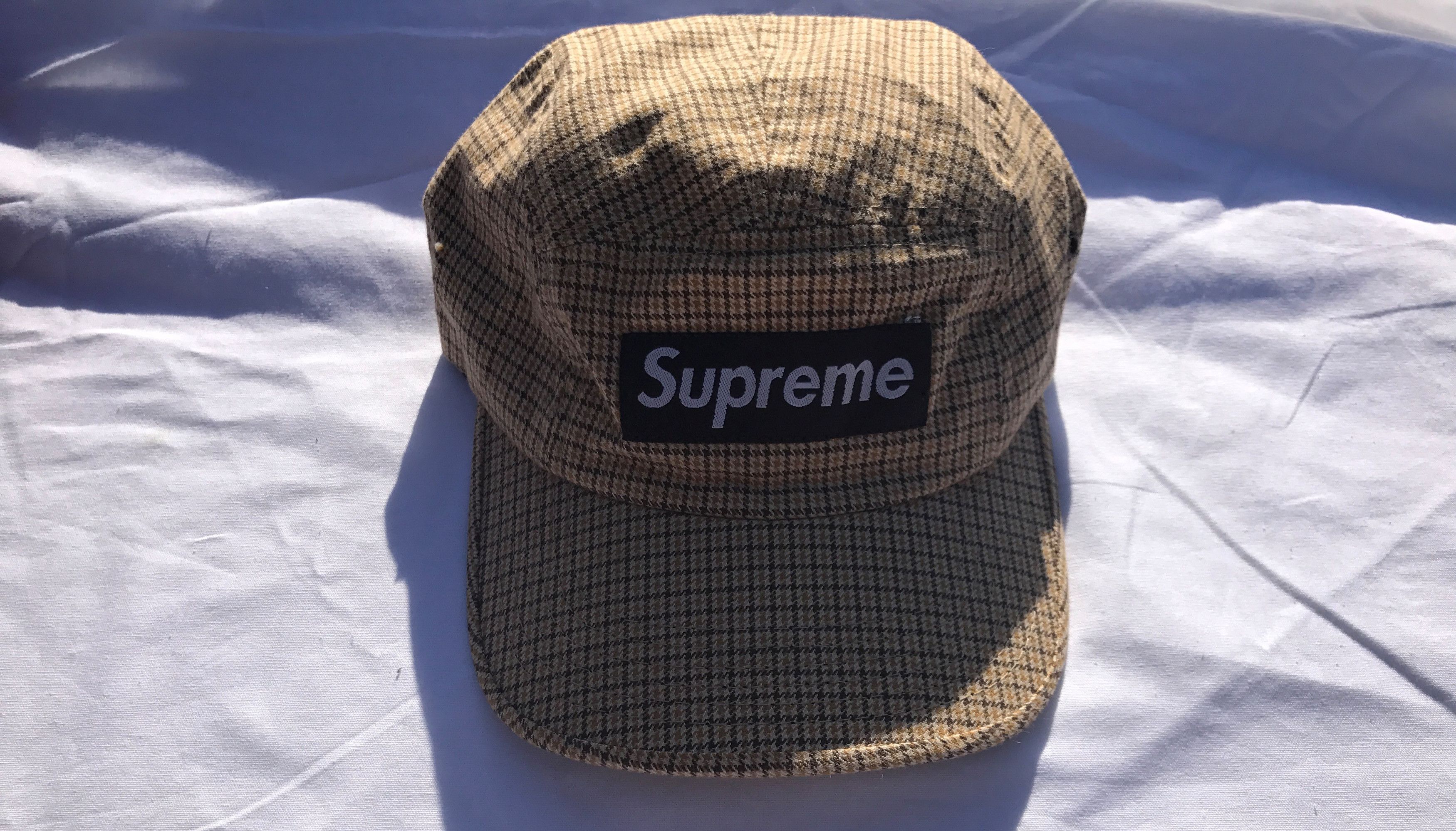 Supreme Supreme houndstooth NYU torch Camp cap feathers posse snapback ...