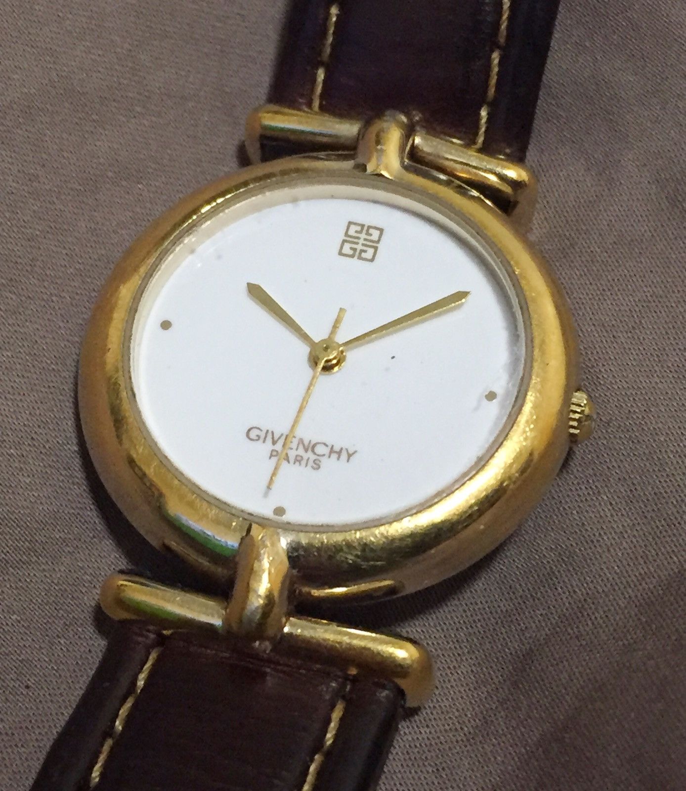 Givenchy VIntage Givenchy Watch Gold/ White | Grailed