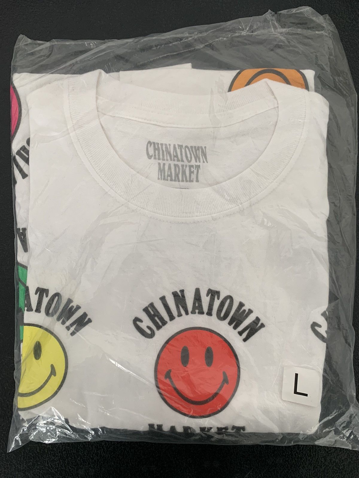Market Chinatown Market Mini Smiley face logo tee white | Grailed