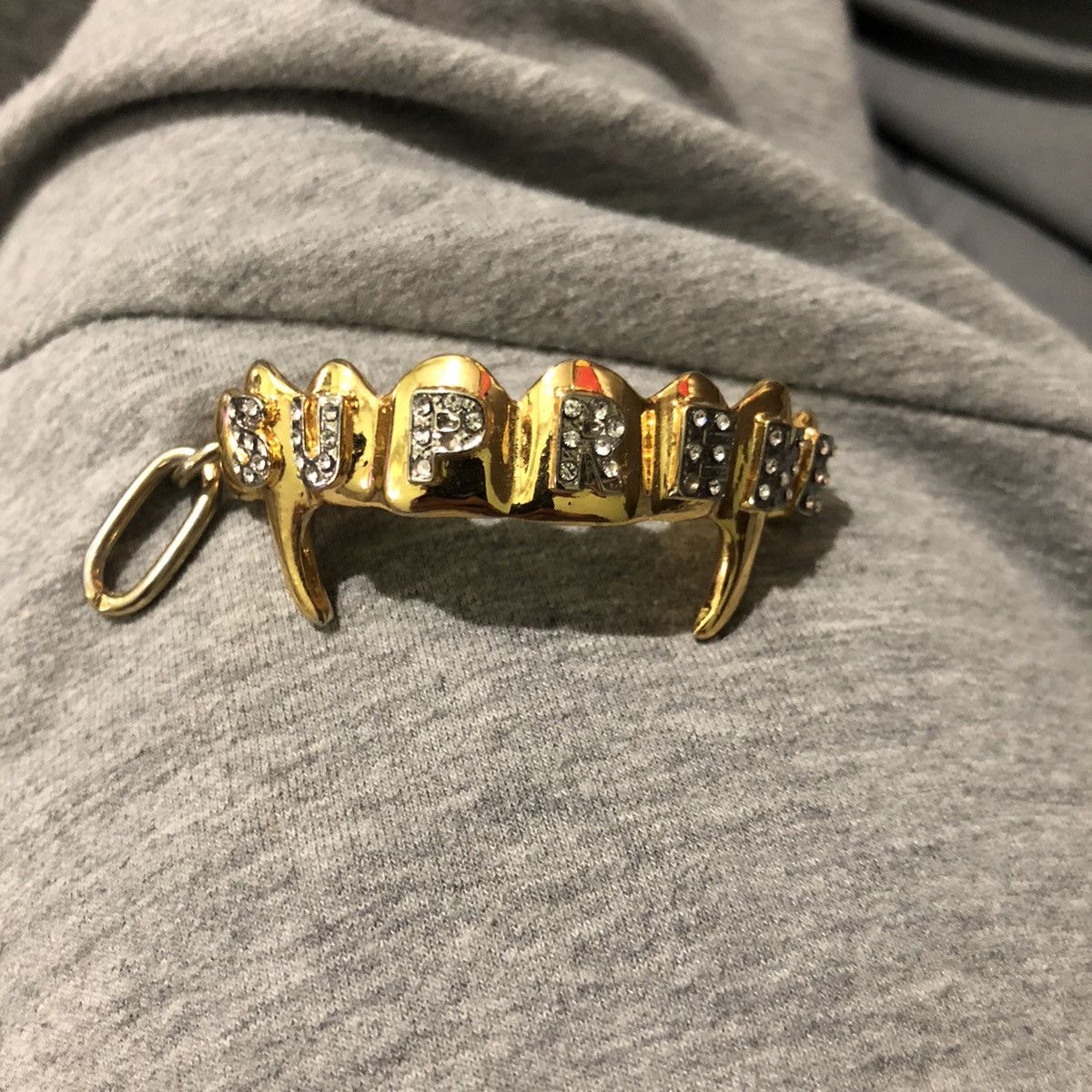 Supreme Supreme Gold Front Teeth Key Chain | Grailed