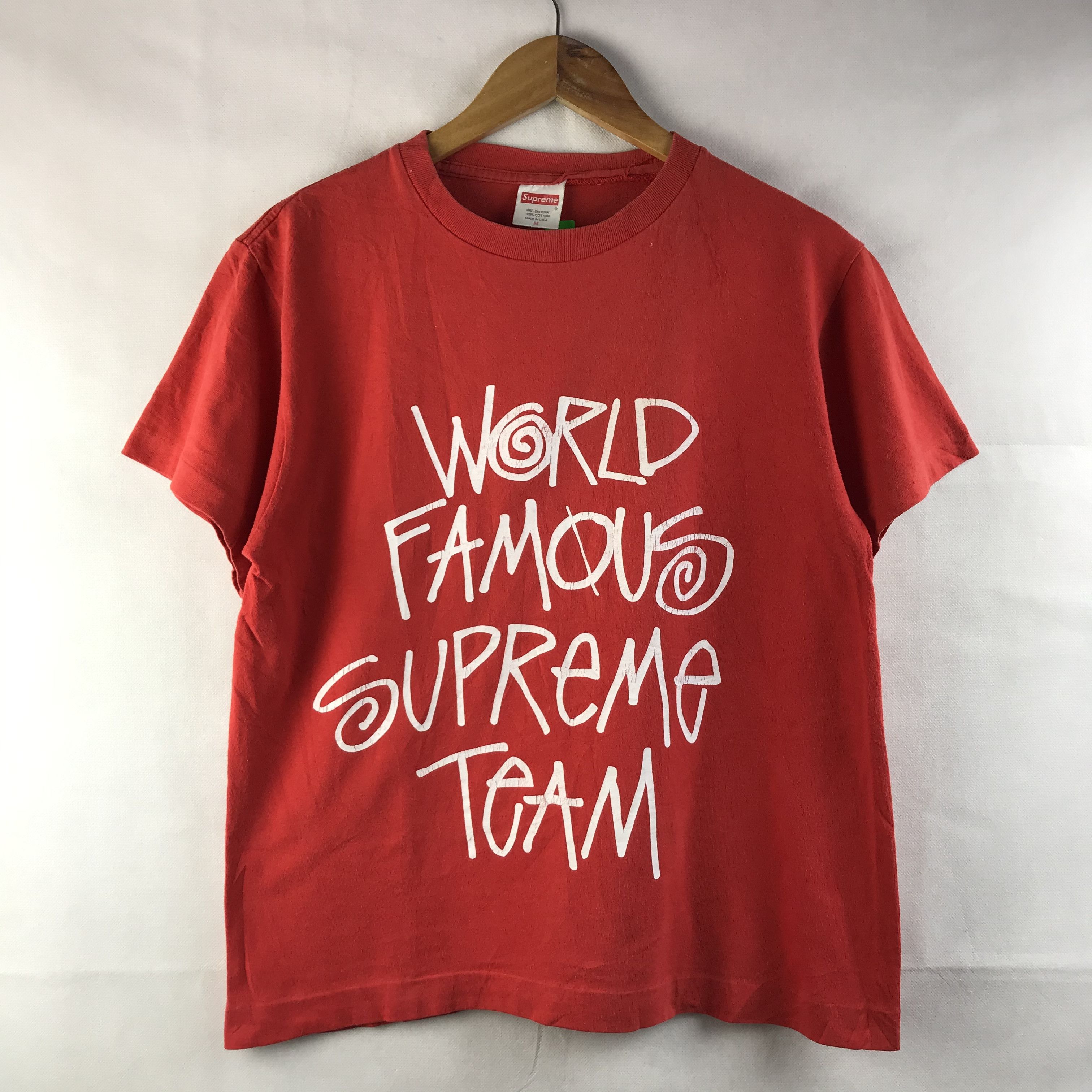Supreme Supreme World Famous Supreme Team Tee Red | Grailed