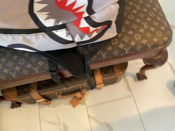 Sprayground SprayGround kaws backpack very rare | Grailed