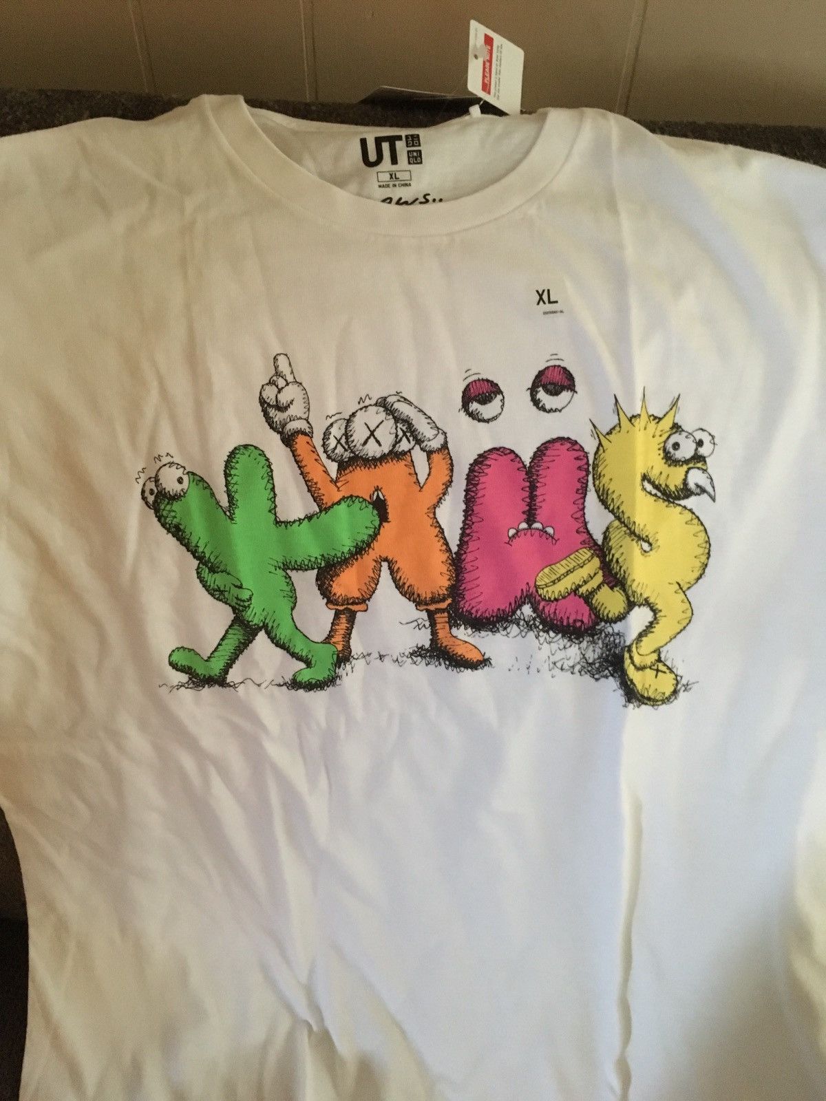Uniqlo Original Fake Kaws Bubble Letters | Grailed