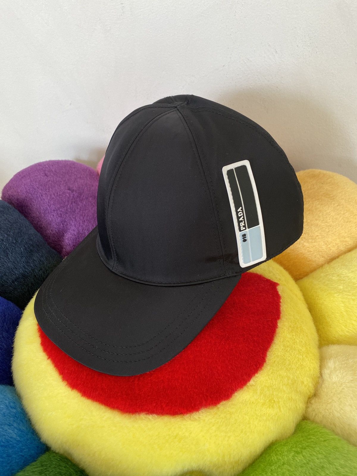 Prada Prada Cappelli IN Tessuto Nero Rubber Tab 018 Hat | Grailed