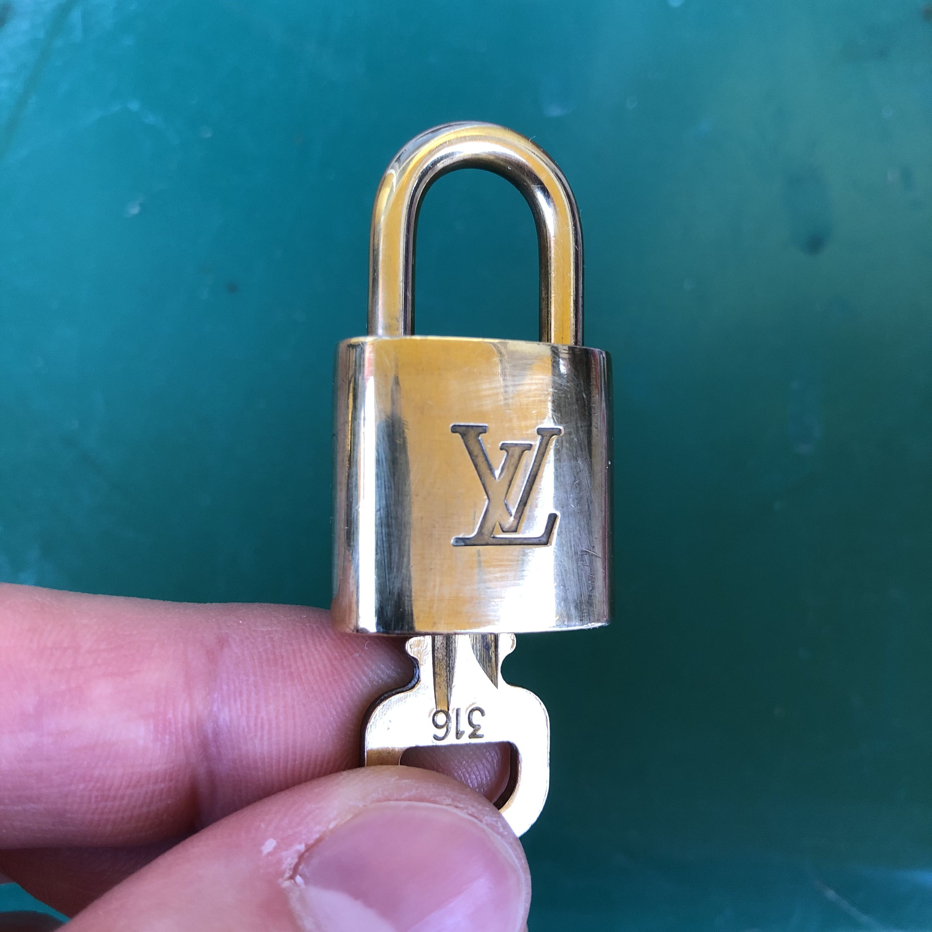 Louis Vuitton Authentic Louis Vuitton 316 Lock Padlock #80 | Grailed