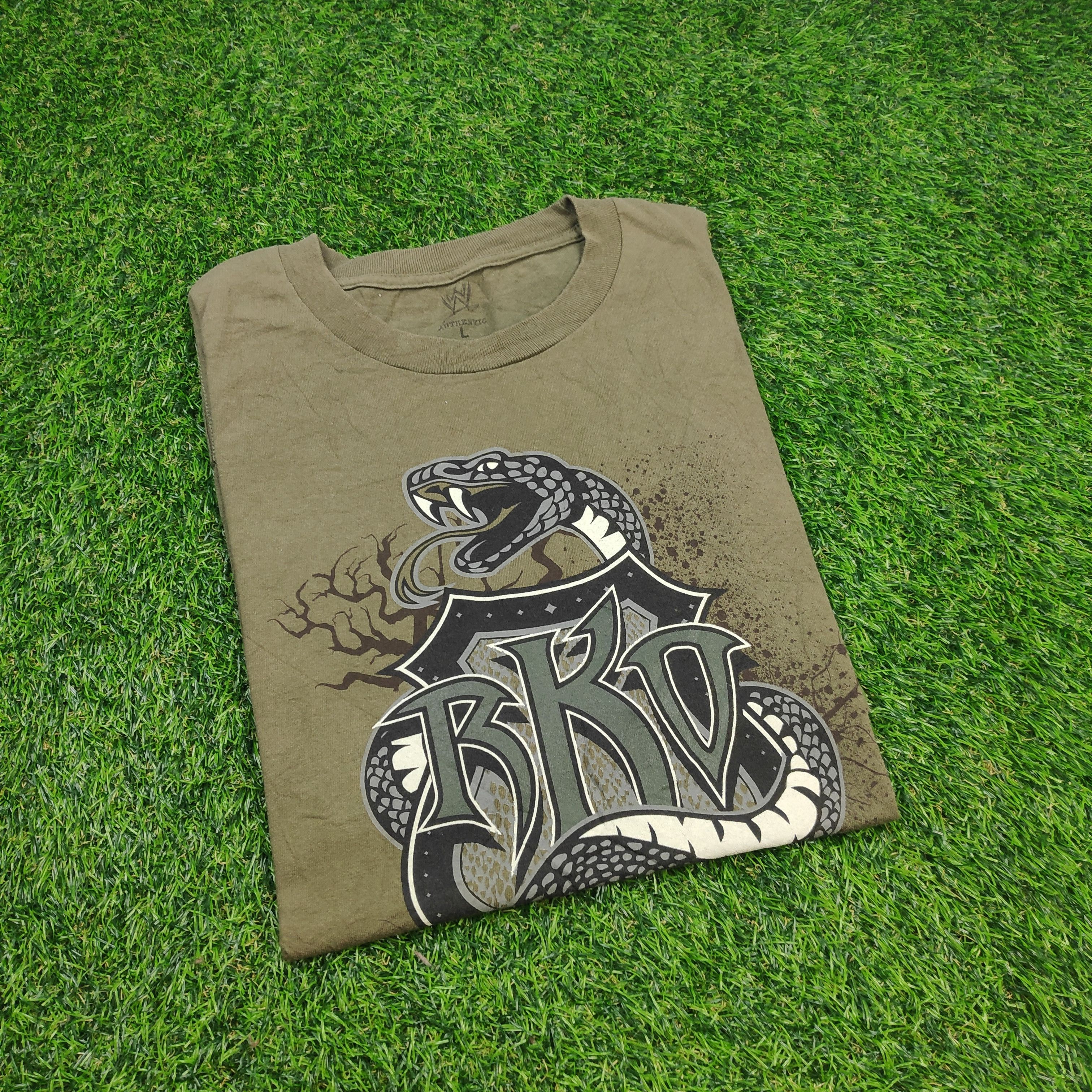 Vintage × WWE WWE Randy Orton RKO Strike First t-shirt | Grailed