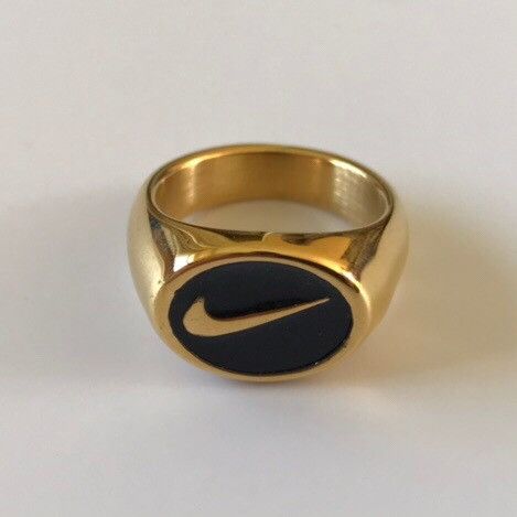 Nike Nike swoosh stainless steel signet ring gold | Grailed