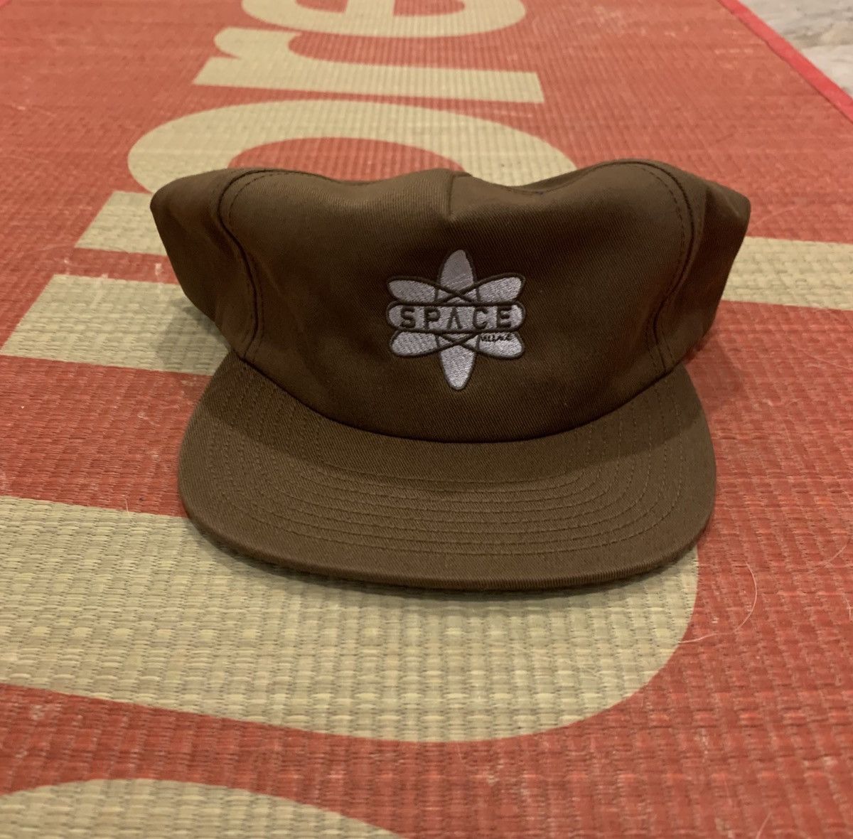 Travis Scott Space village Houston Travis Scott hat brown in color ...