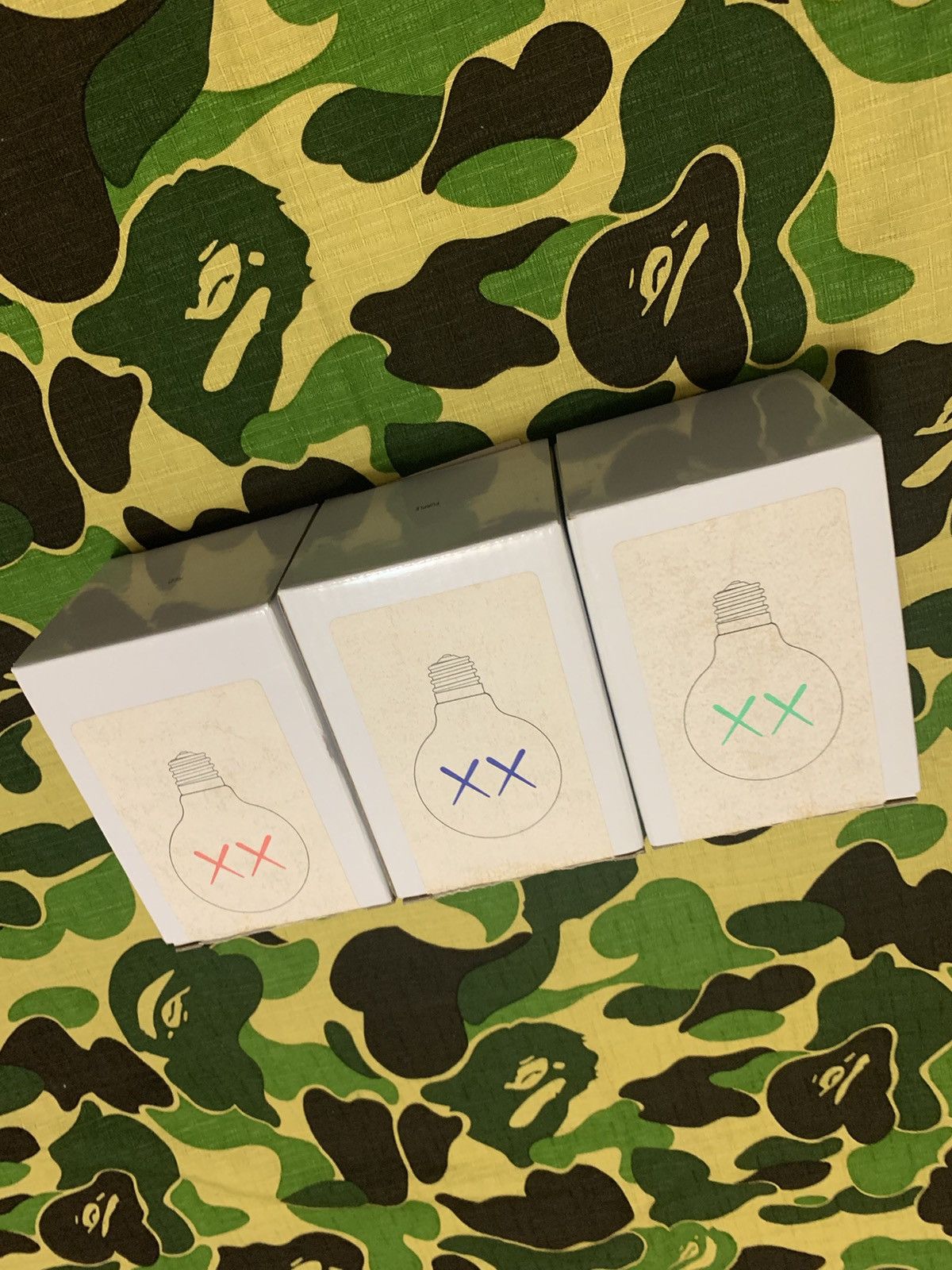 Kaws KAWS/ The Standard Light Bulbs Set of 3 | Grailed