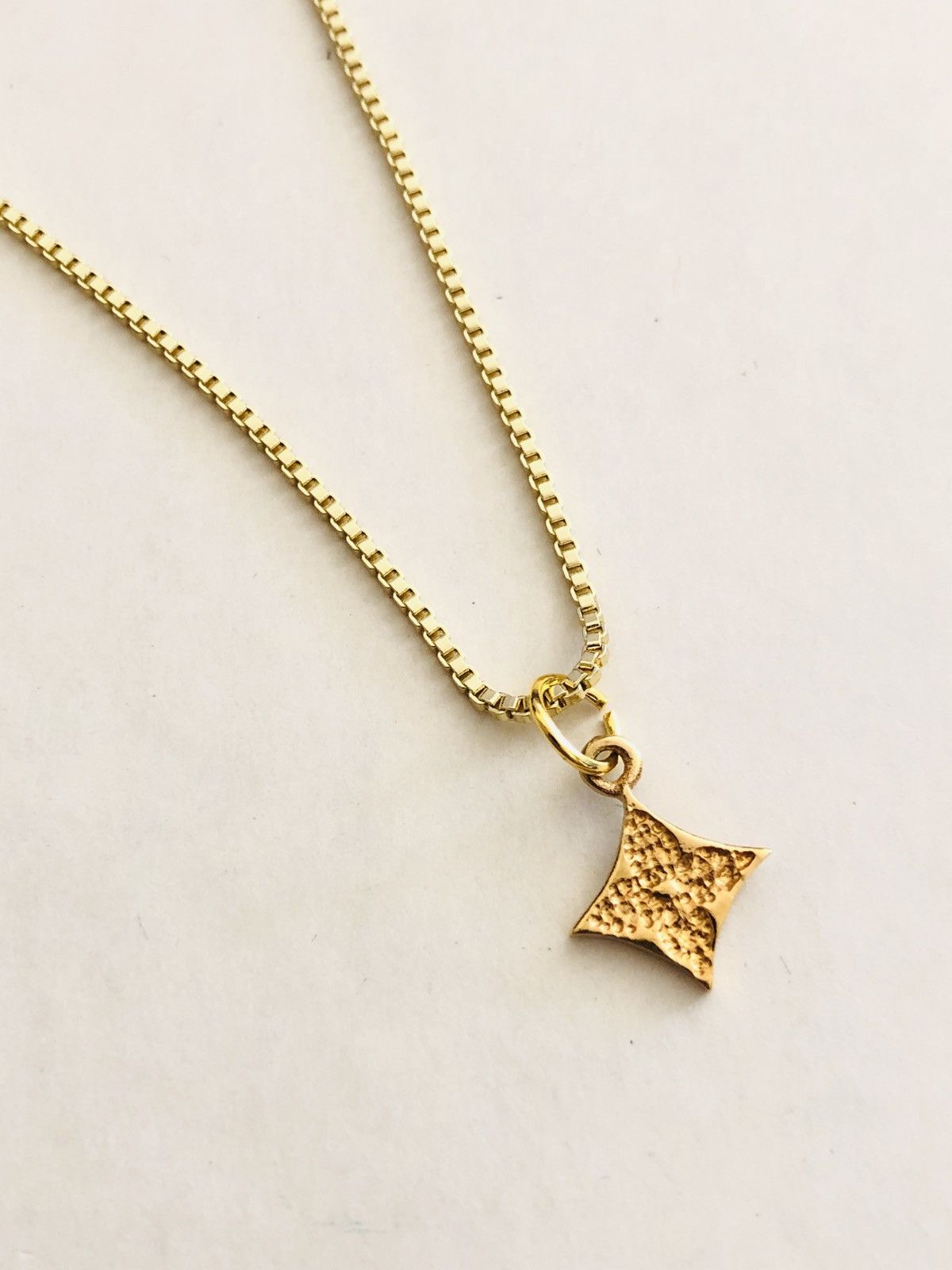 Louis Vuitton Louis Vuitton Mini LV Clover Pendant on Chain/Necklace ...