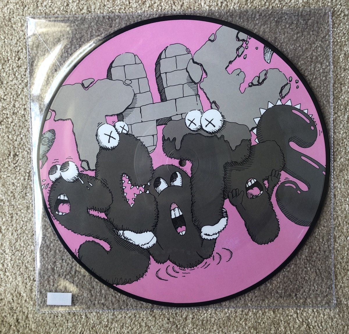 Kaws × Travis Scott The scotts and kaws 12 inch picture disk | Grailed