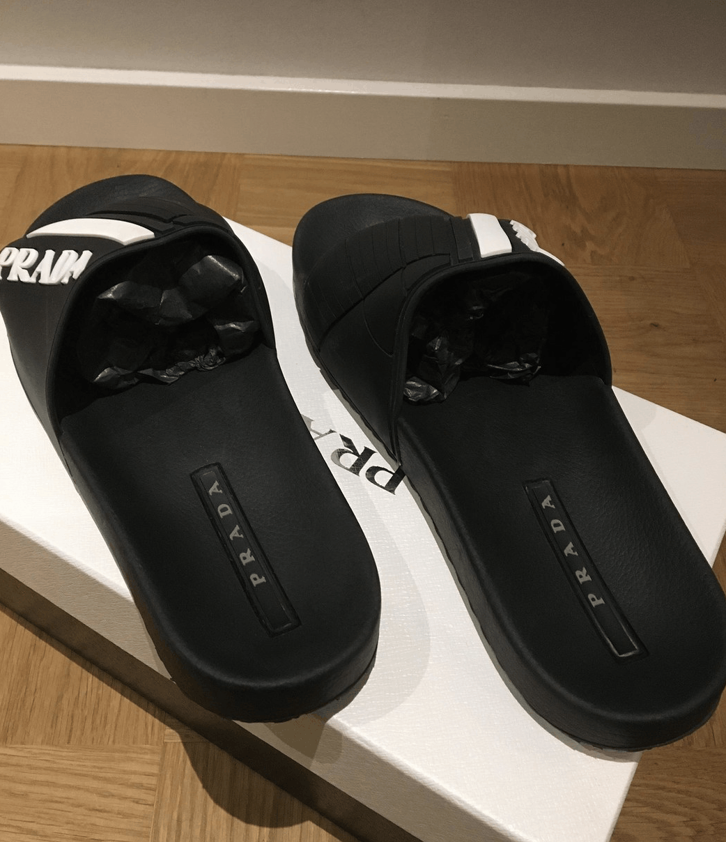 Prada Prada Rubber Logo Embossed Pool Slides | Grailed