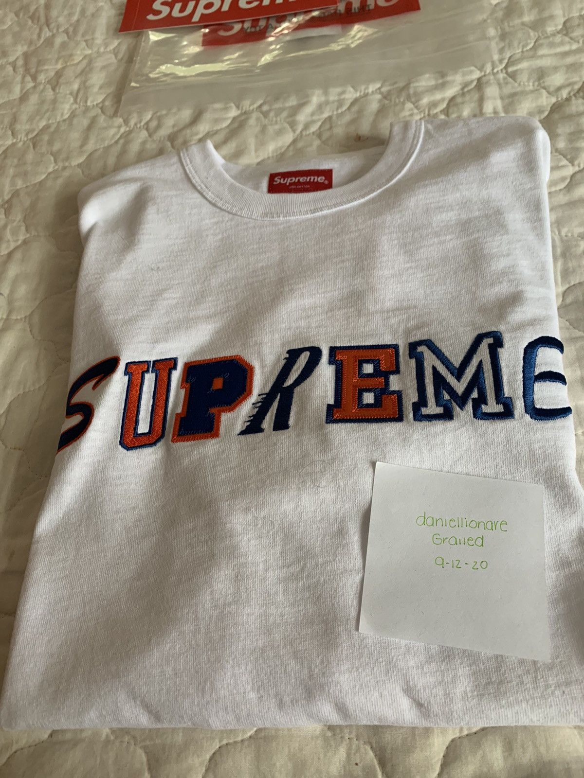 Supreme Supreme Collage Logo S/S Top | Grailed
