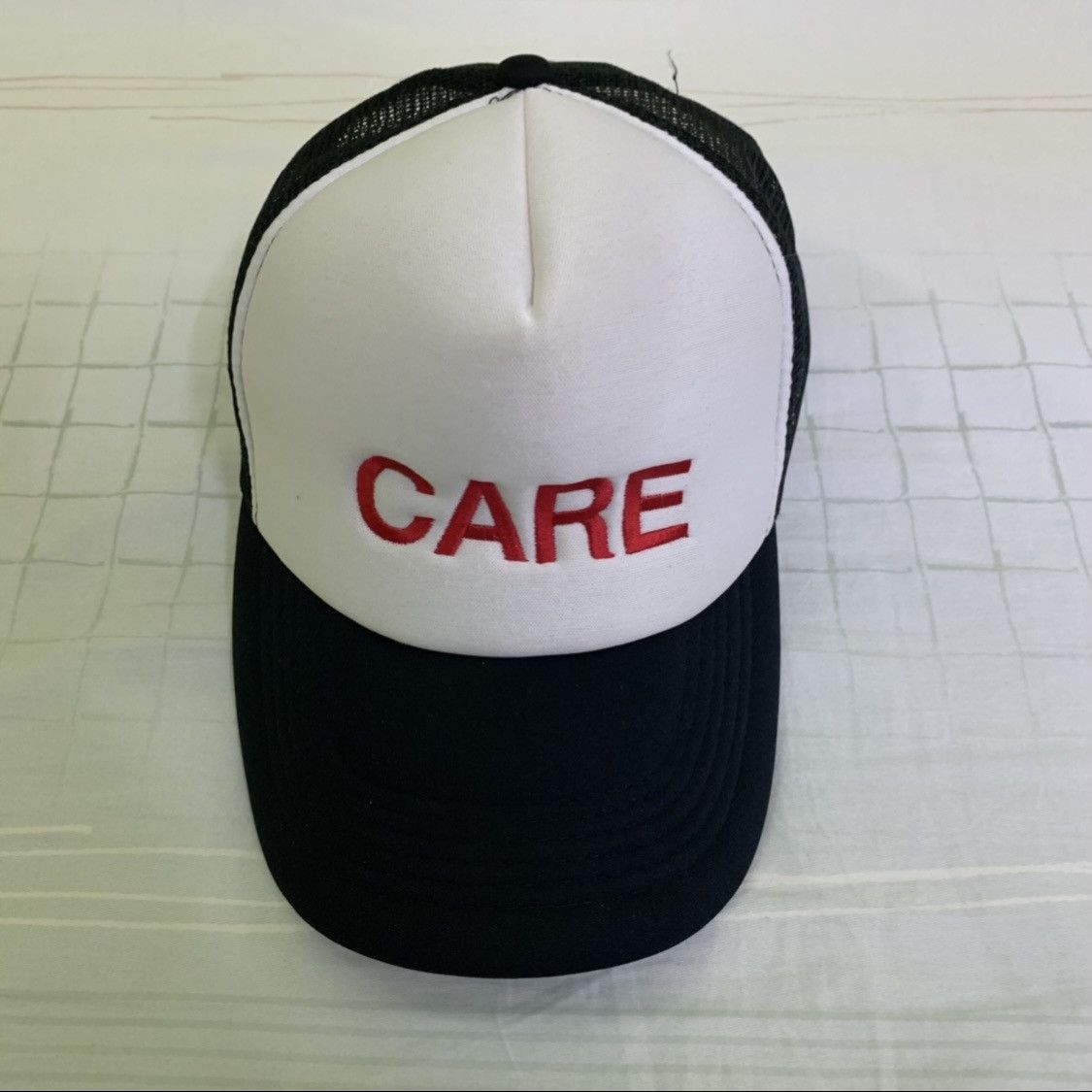 Saba Saba x Pivot Gang “Care” Trucker Hat | Grailed