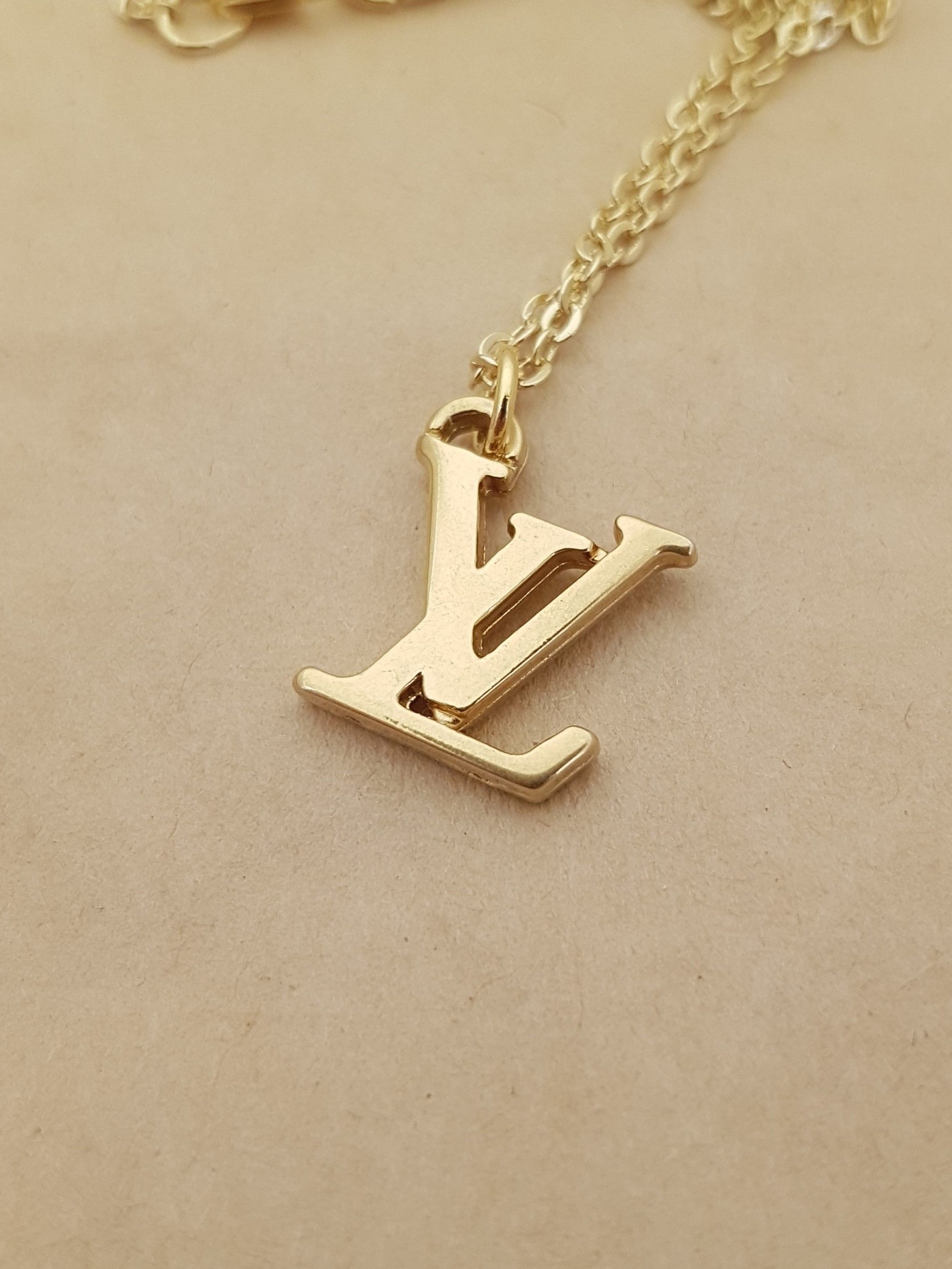 Jewelry × Louis Vuitton × Vintage LV Pendant & Gold-plated Chain | Grailed