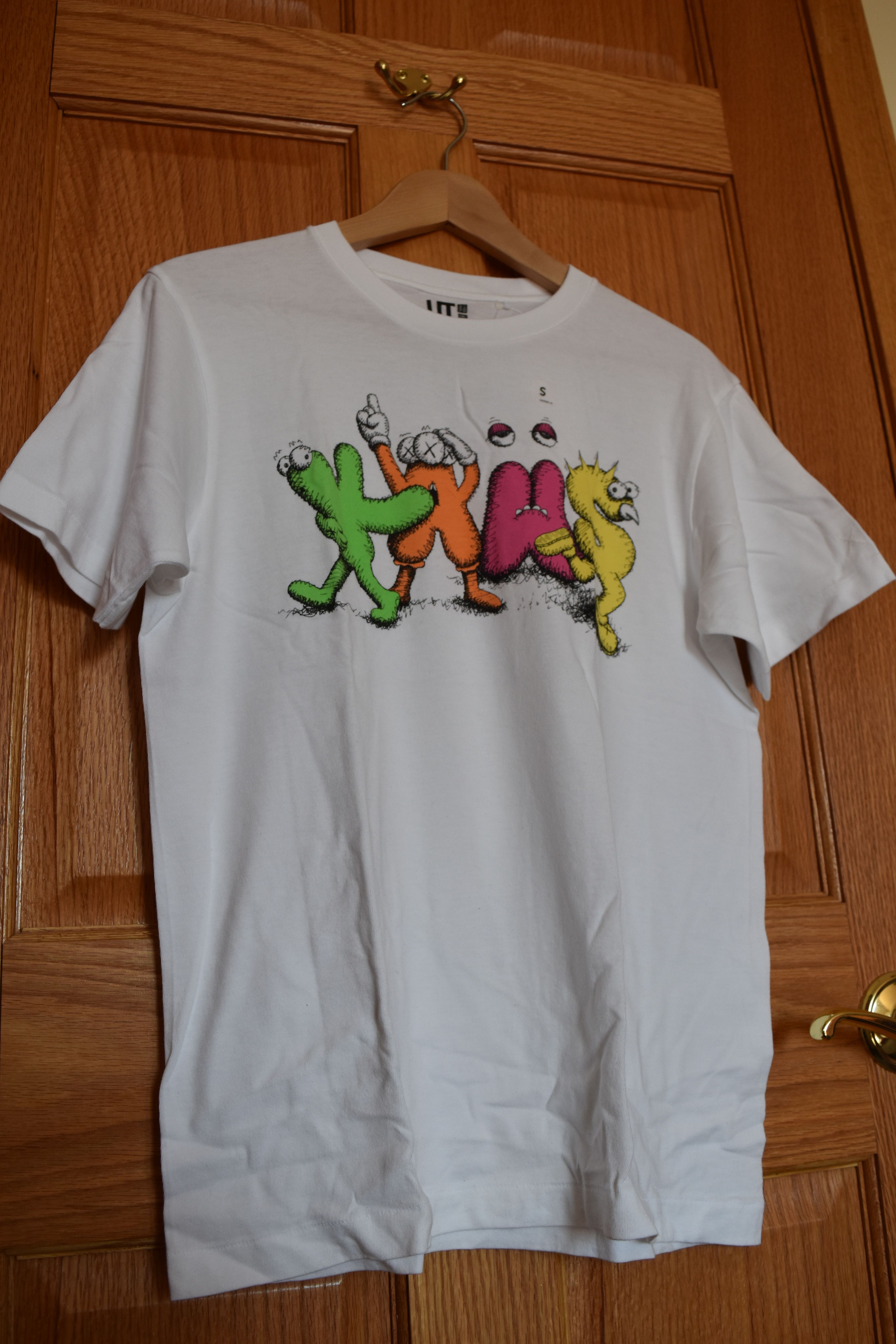 Uniqlo Kaws Font Graphic Tee | Grailed