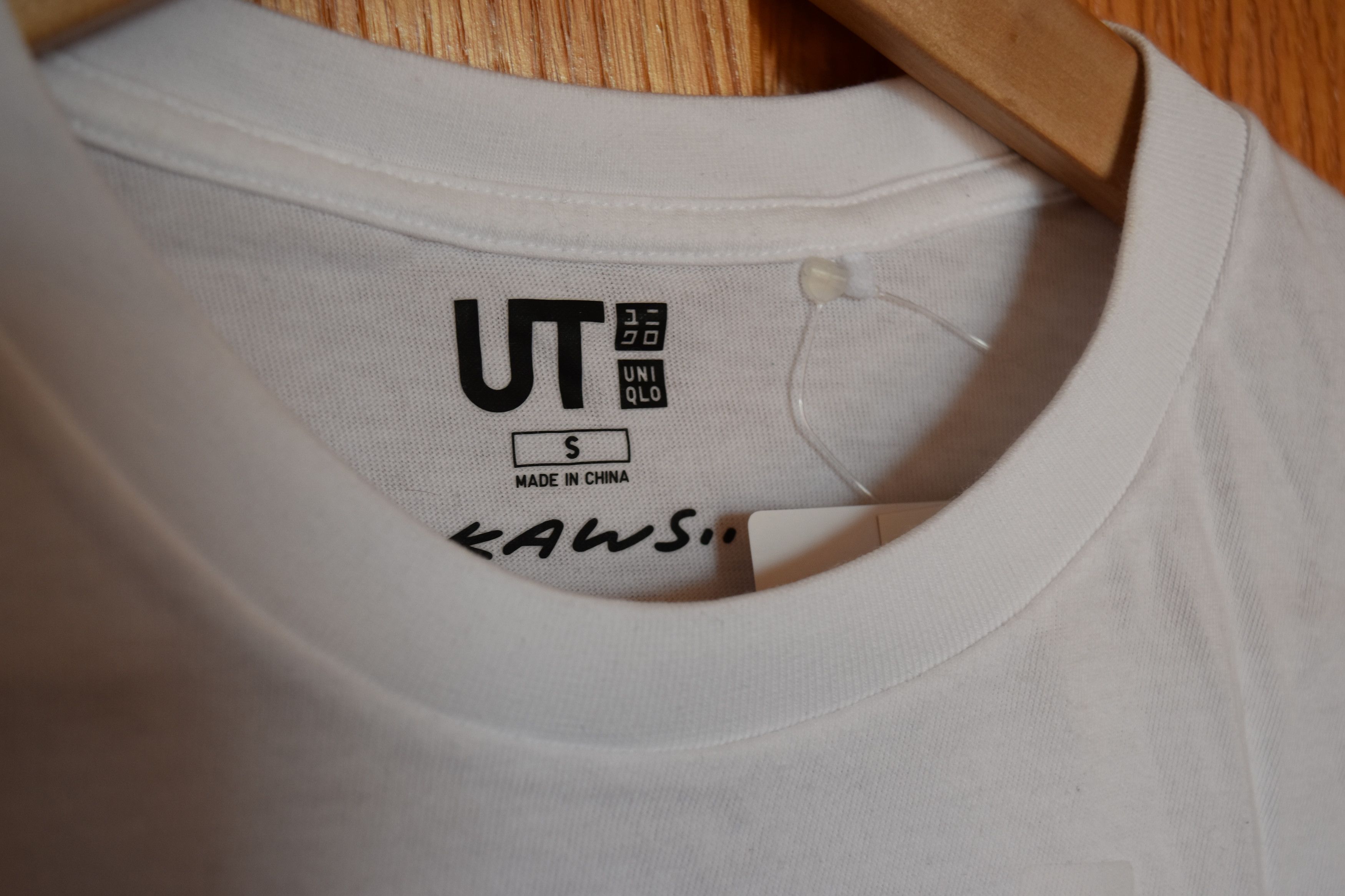 Uniqlo Kaws Font Graphic Tee | Grailed