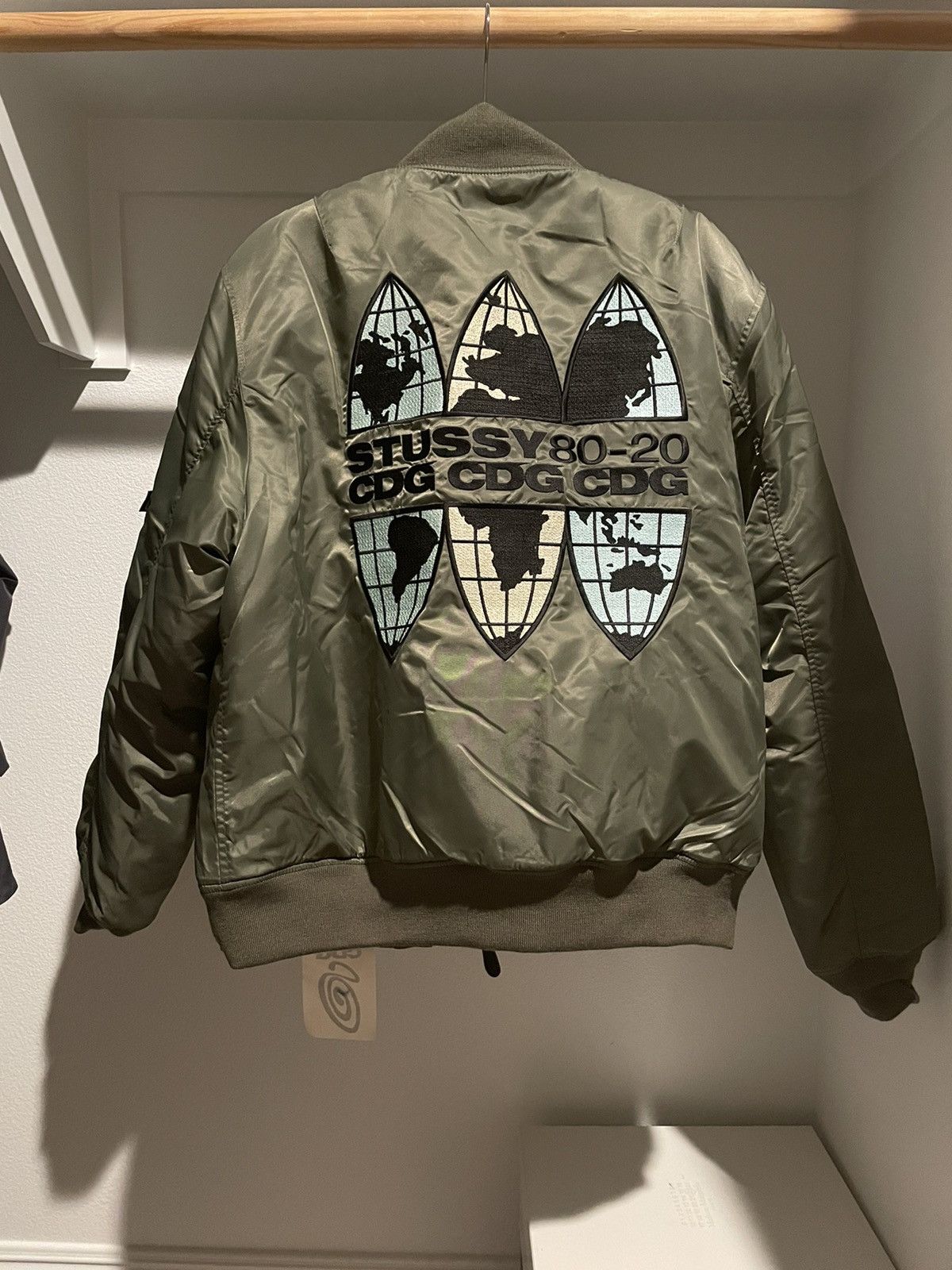 CDG CDG CDG × Stussy (Offer)Stussy x CDG 40th Anniversary MA-1 Bomber Jacket | Grailed