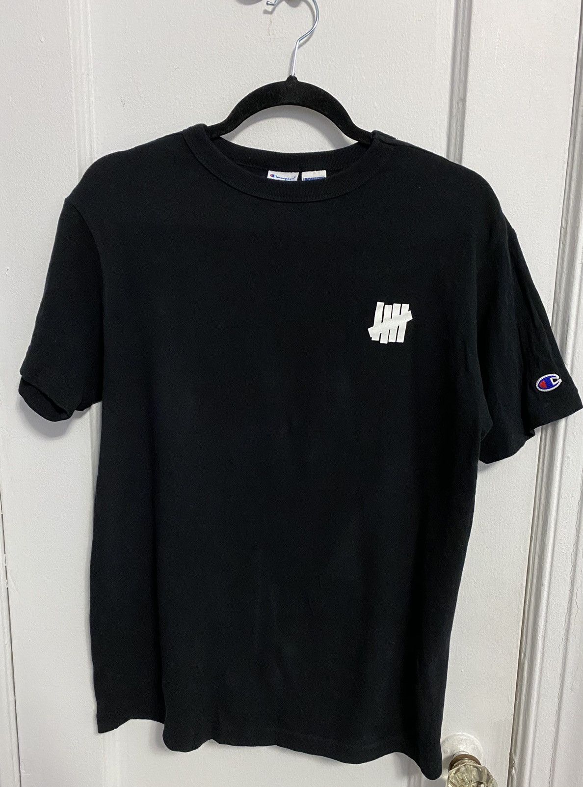 Champion × Undefeated Undefeated x Champion Logo Black Tee | Grailed
