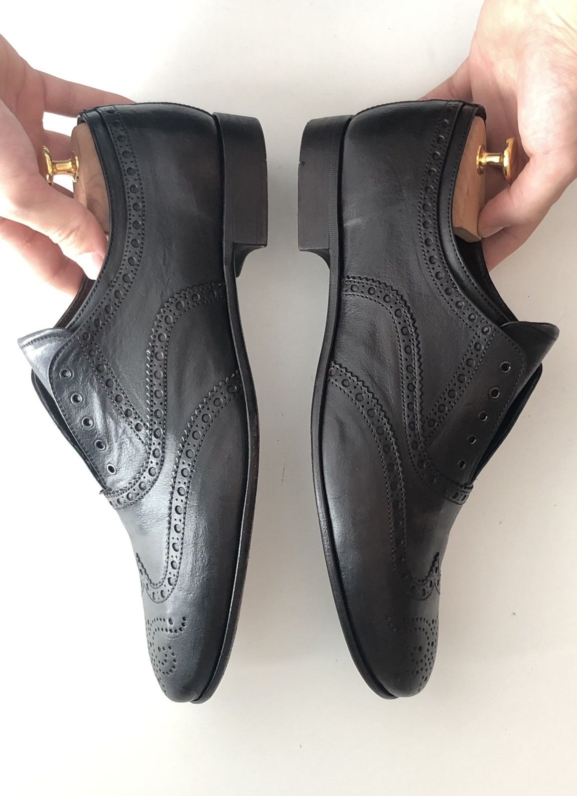 Prada Dark brown eyelet brogue slip ons slippers | Grailed