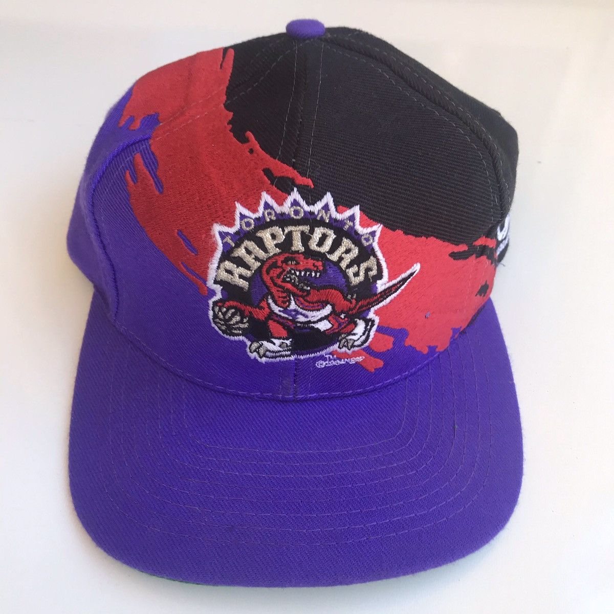 Vintage Vintage Logo Athletic Toronto Raptors splash snapback hat | Grailed