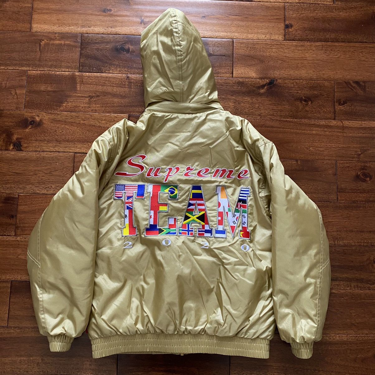 Supreme Supreme Team Puffy Jacket | Grailed