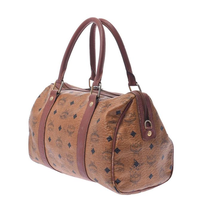MCM Monogram Mini Hand Bag | Grailed