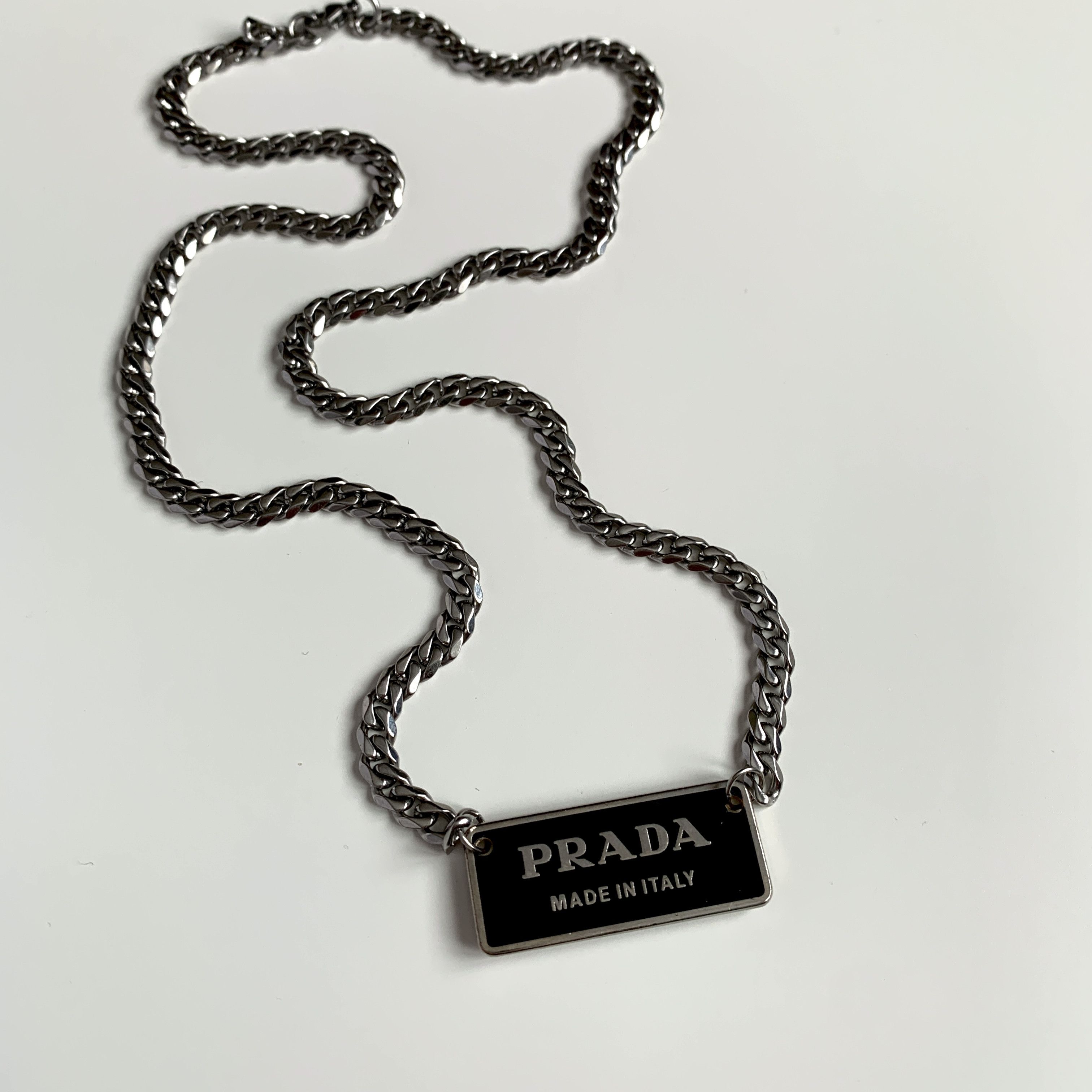Prada Prada necklace chain pendant silver Black | Grailed