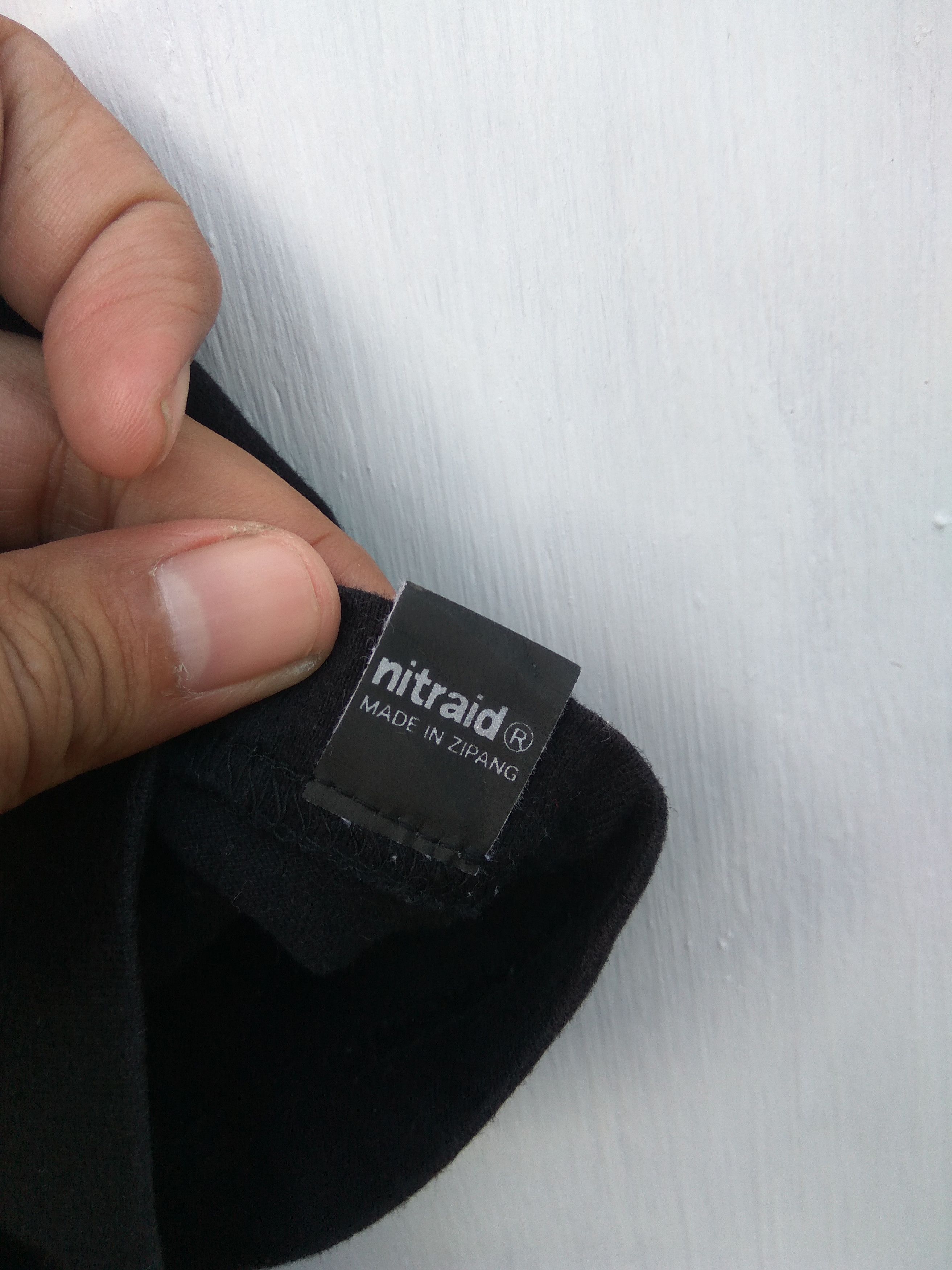 Nitraid Nitraid t shirt spell out anti babylon equipment | Grailed