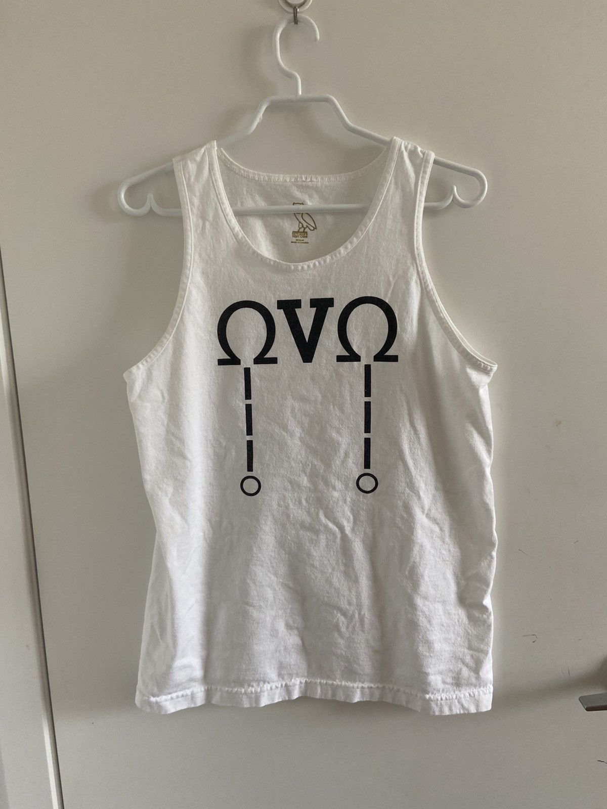 Octobers Very Own OVO Drake omega logo tank top White | Grailed