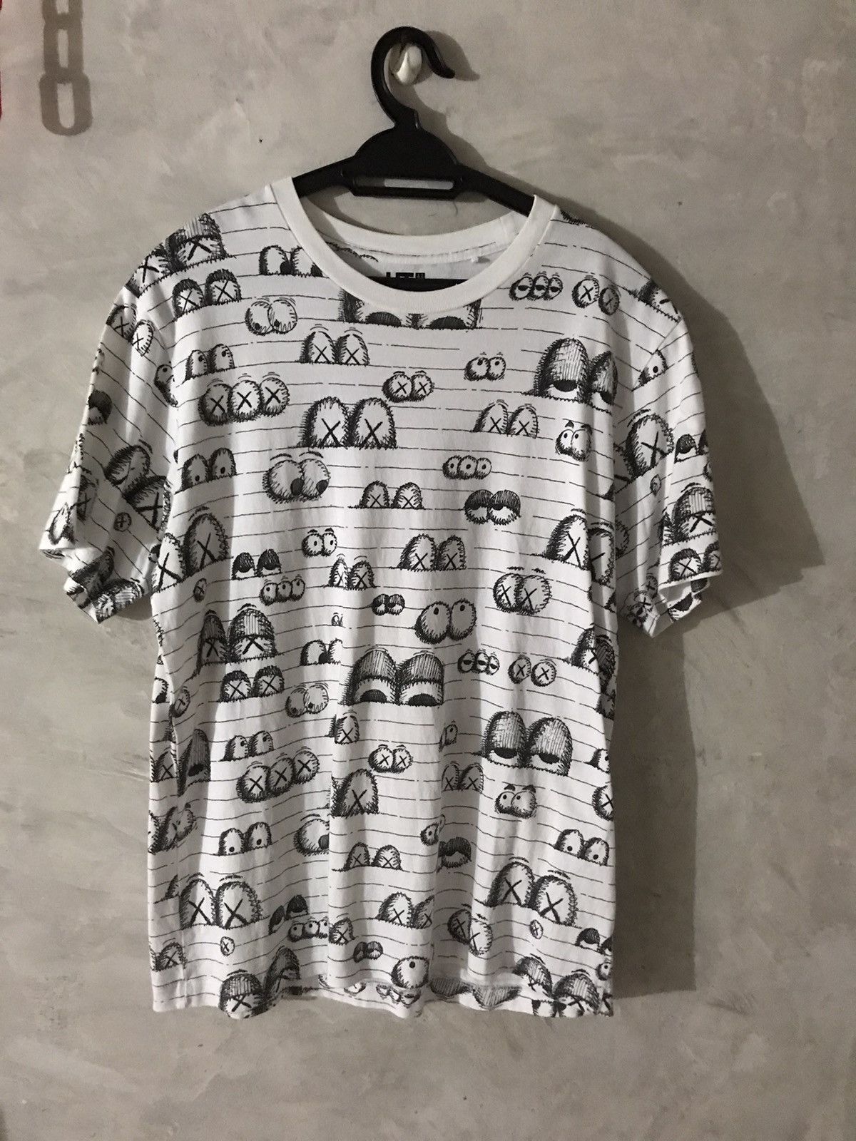 Uniqlo Kaws x uniqlo notebook design | Grailed