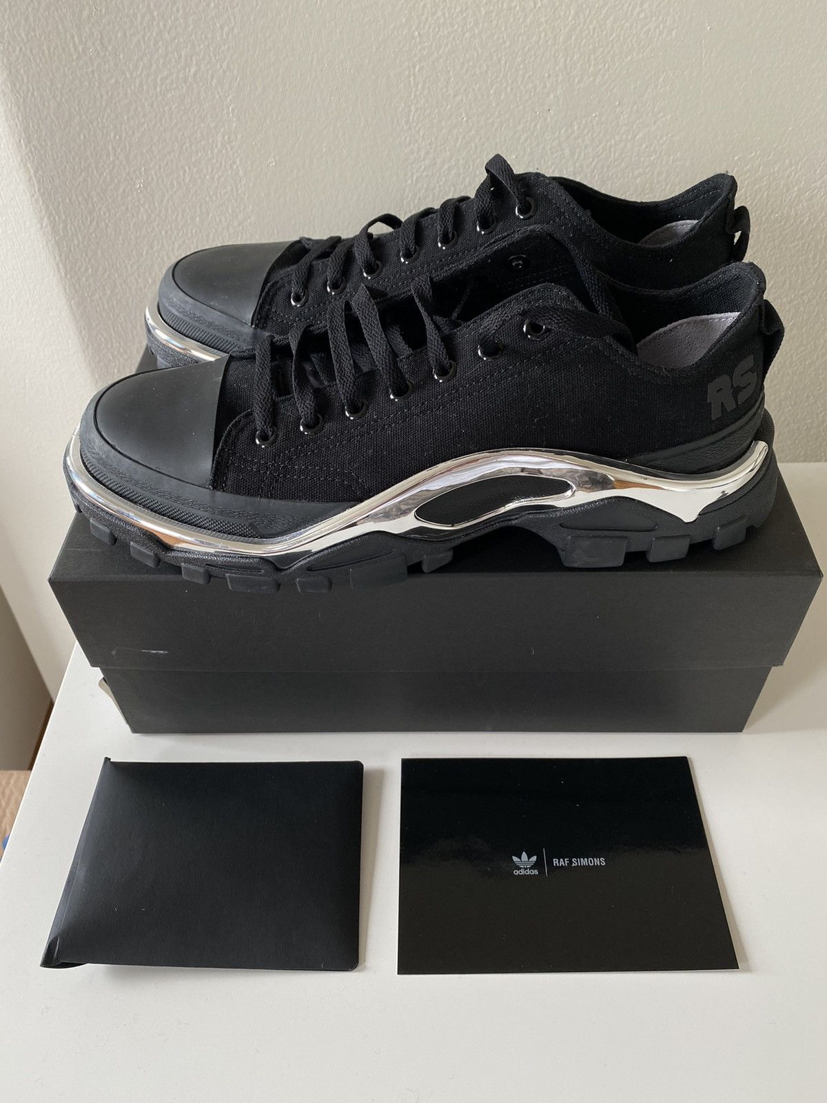 Raf Simons Raf Simons Black and Silver Detroit Runner | Grailed