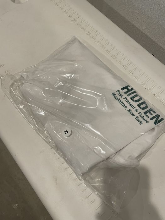 HIDDEN Hidden cloud logo tee (green logo) | Grailed