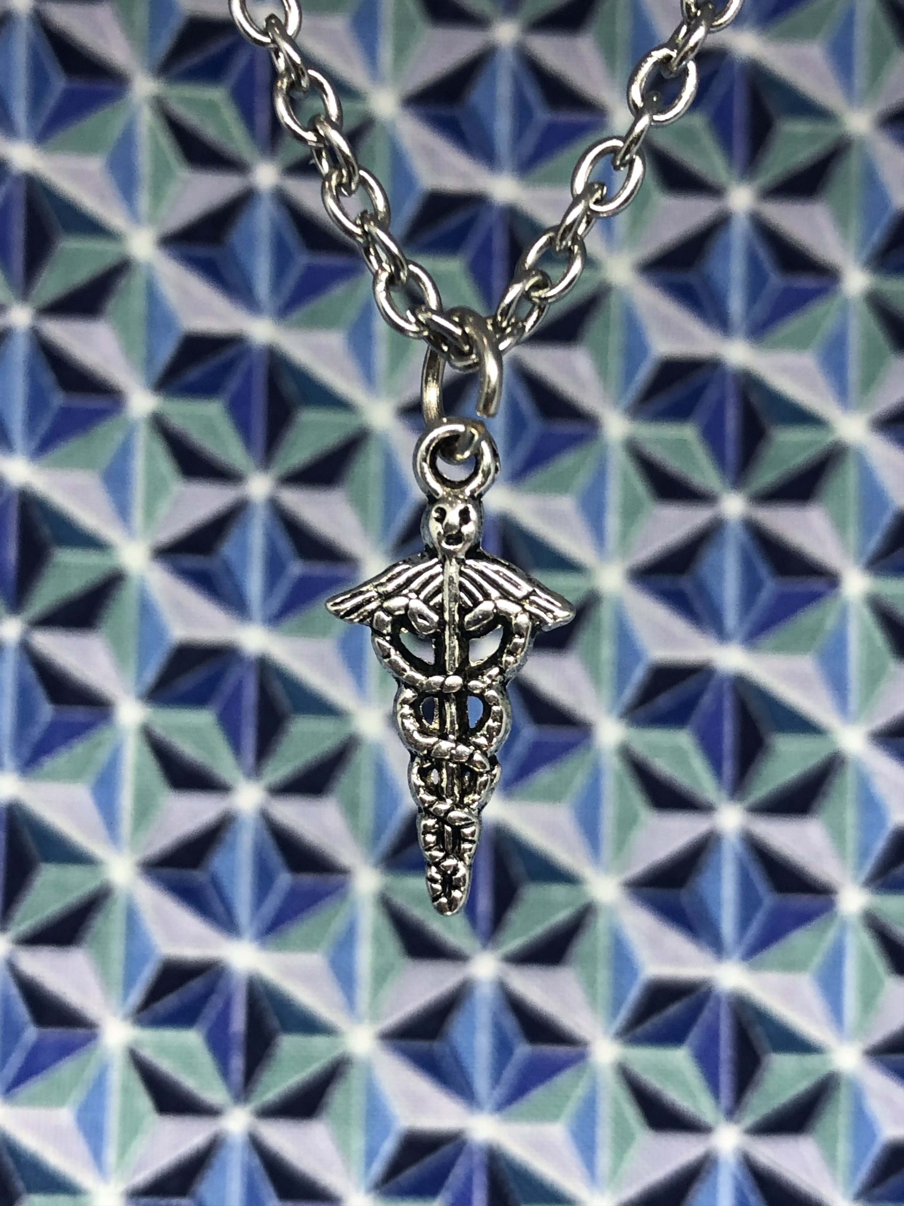 Chain Caduceus necklace | Grailed