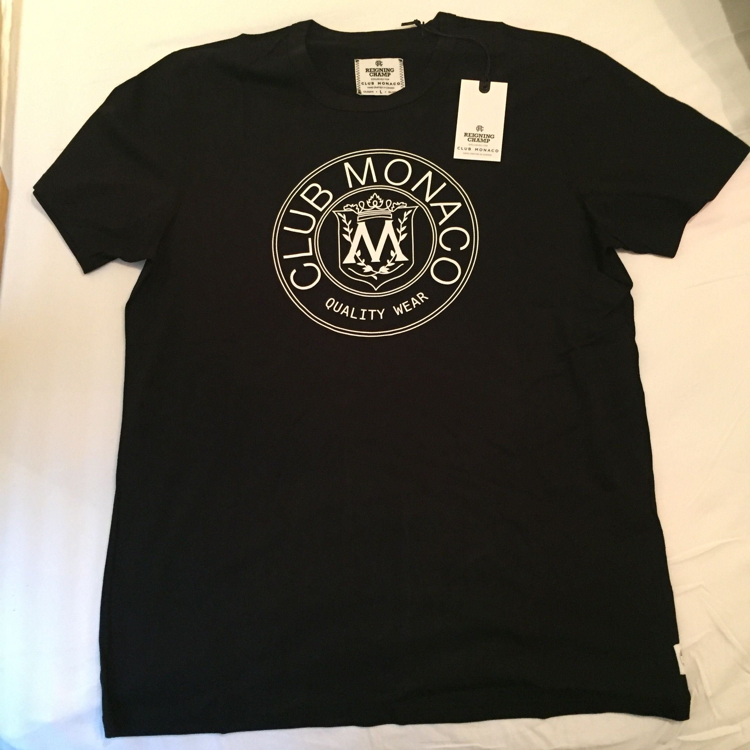 Club Monaco × Reigning Champ Club Monaco Crest Logo Tee Black size ...