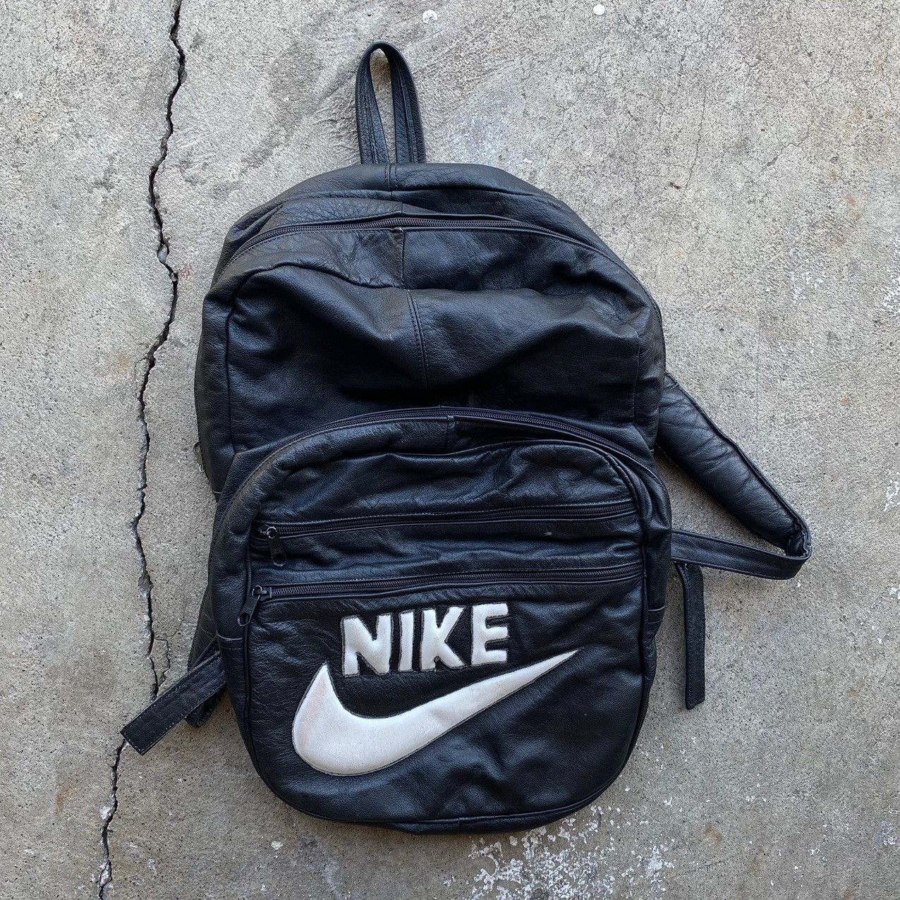 Nike Vintage 1980s Black and white leather Nike backpack | Grailed