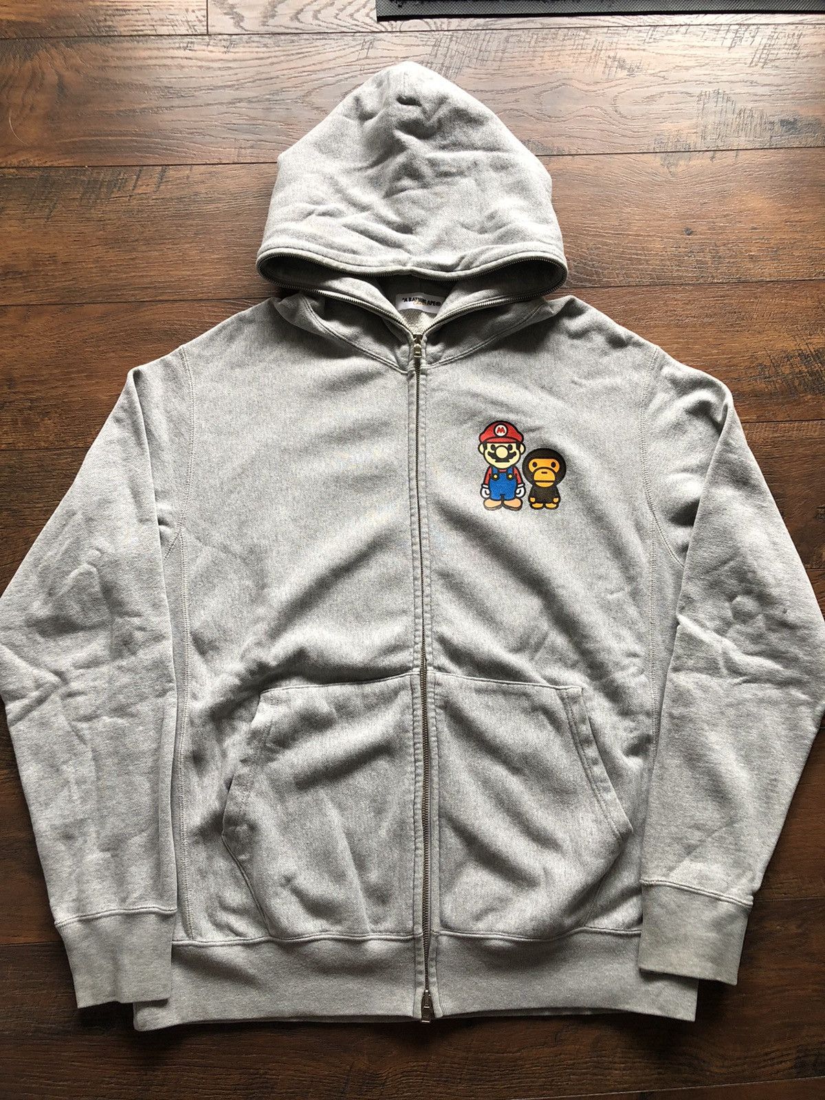 Bape × Nintendo 2008 Bape baby milo x Mario full zip hoodie grey | Grailed